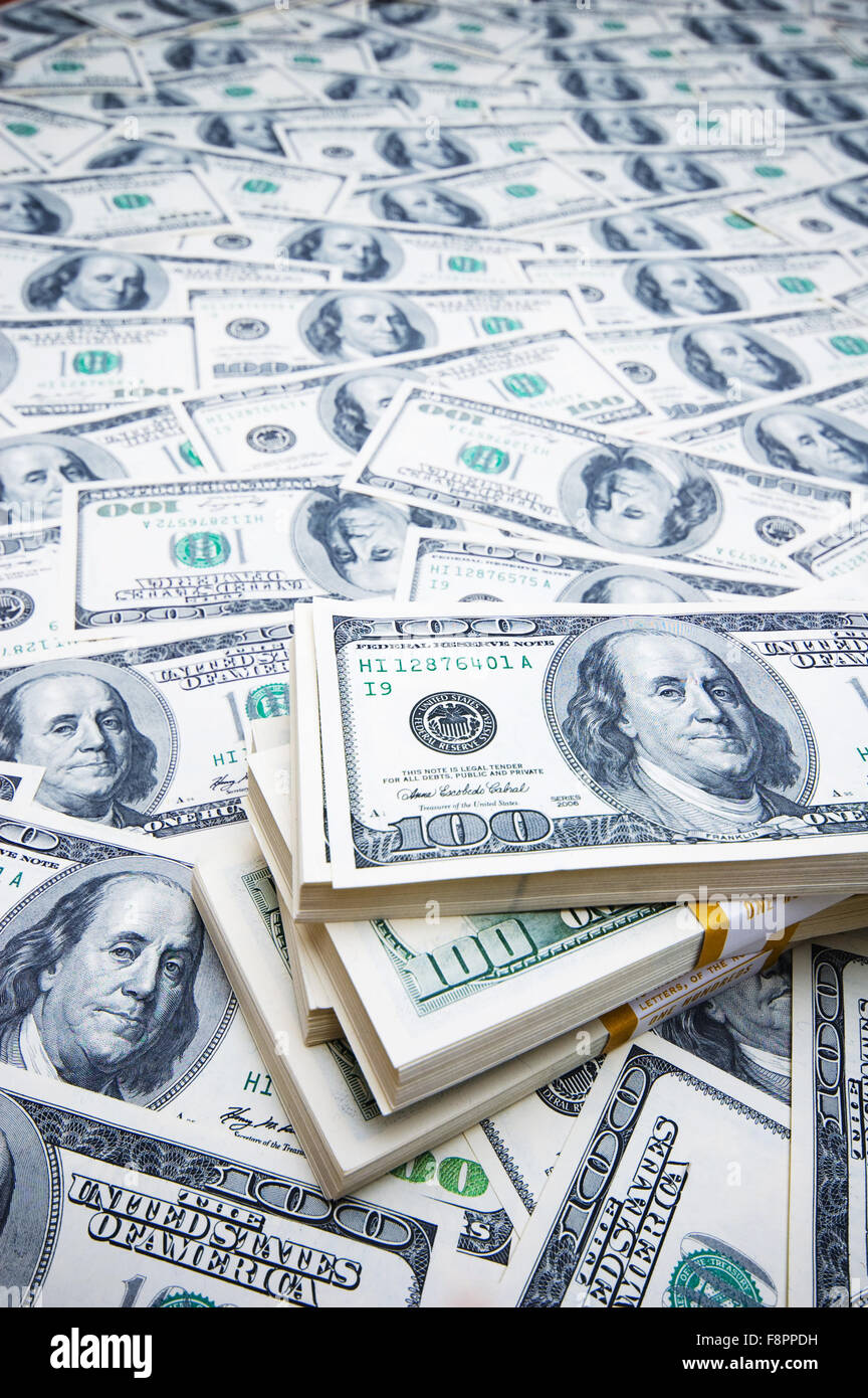 Stack of dollars on money background Stock Photo - Alamy
