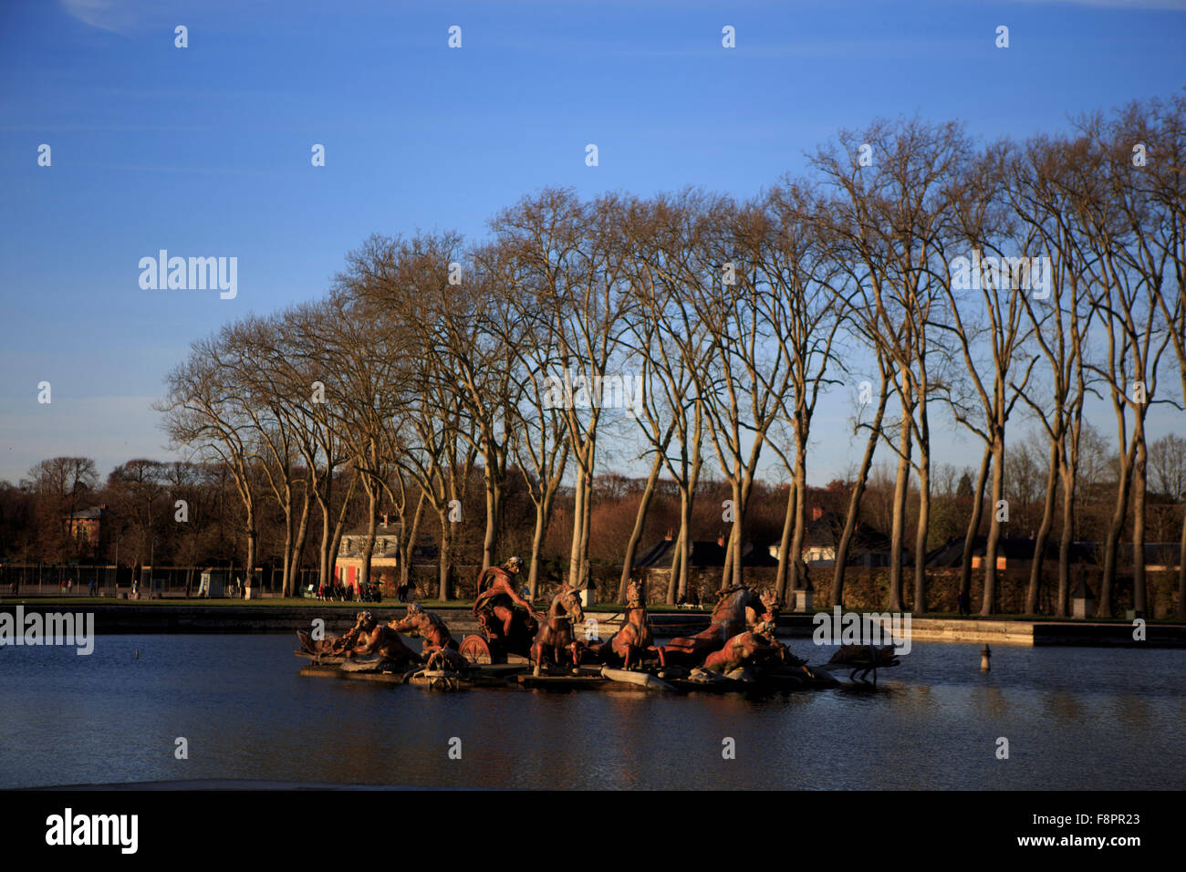 Late afternoon sun strikes the Apollo Fountain in the grounds of the ...