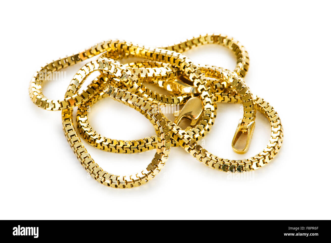 Golden chain isolated on the white background Stock Photo - Alamy