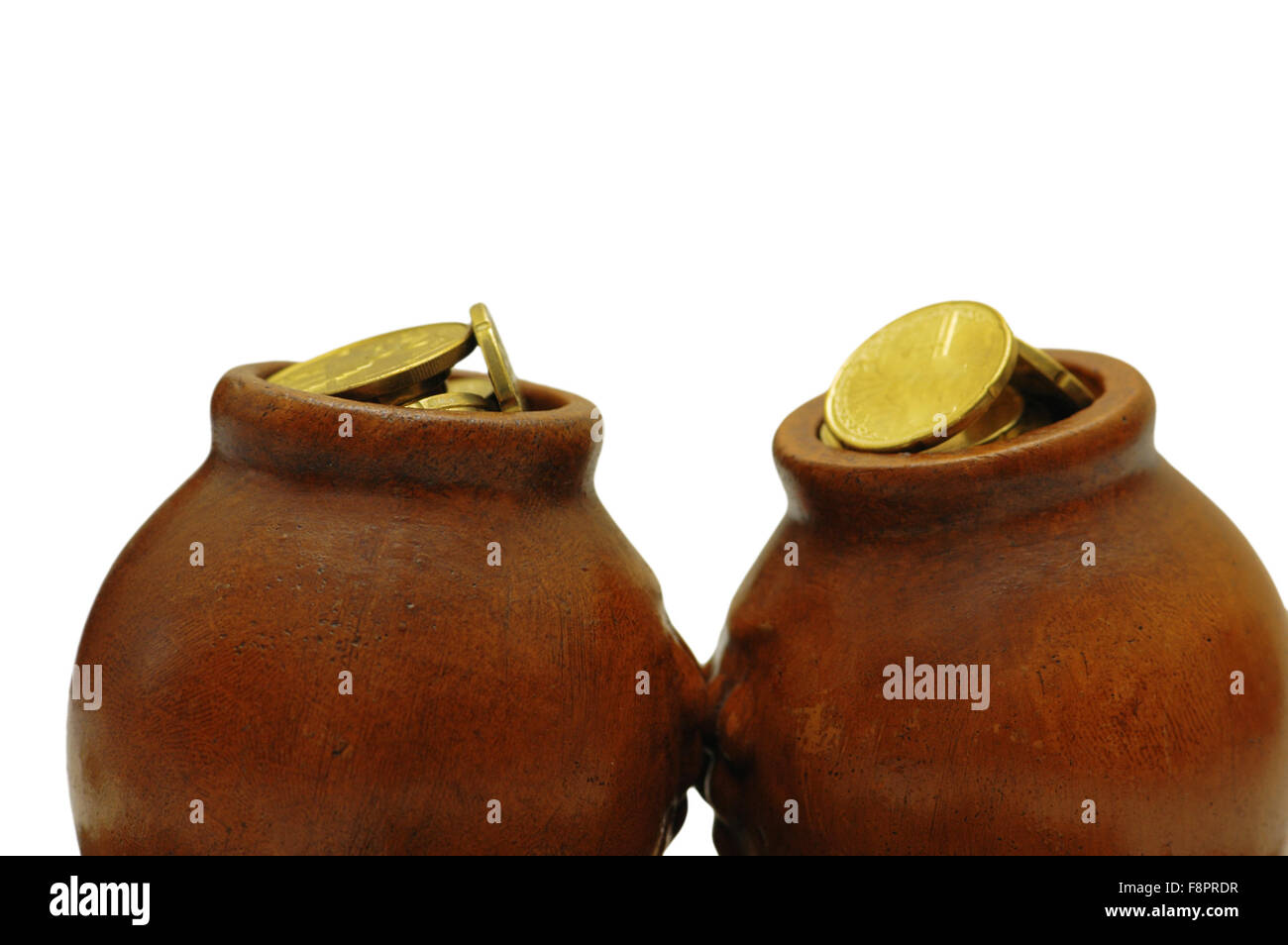 Two clay pots with golden coins isolated on white Stock Photo - Alamy