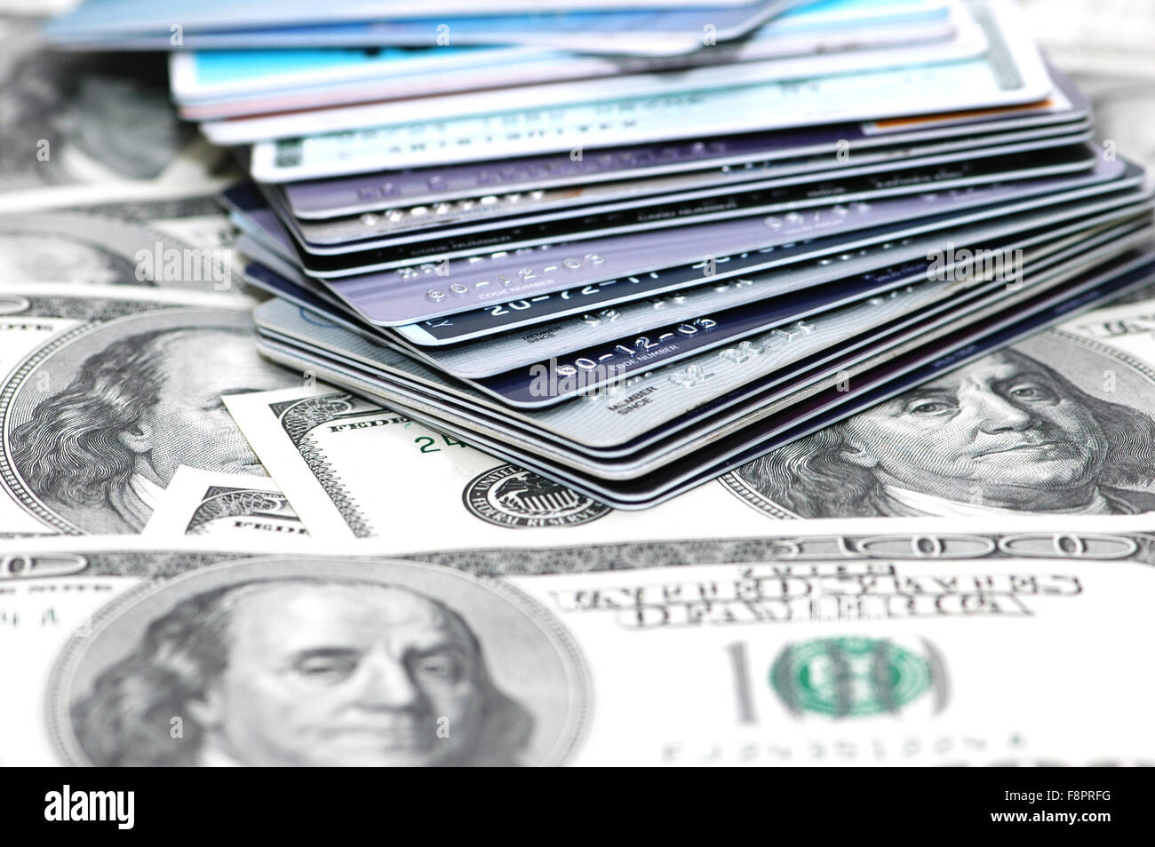 Stack of credit cards and dollar bank notes Stock Photo - Alamy