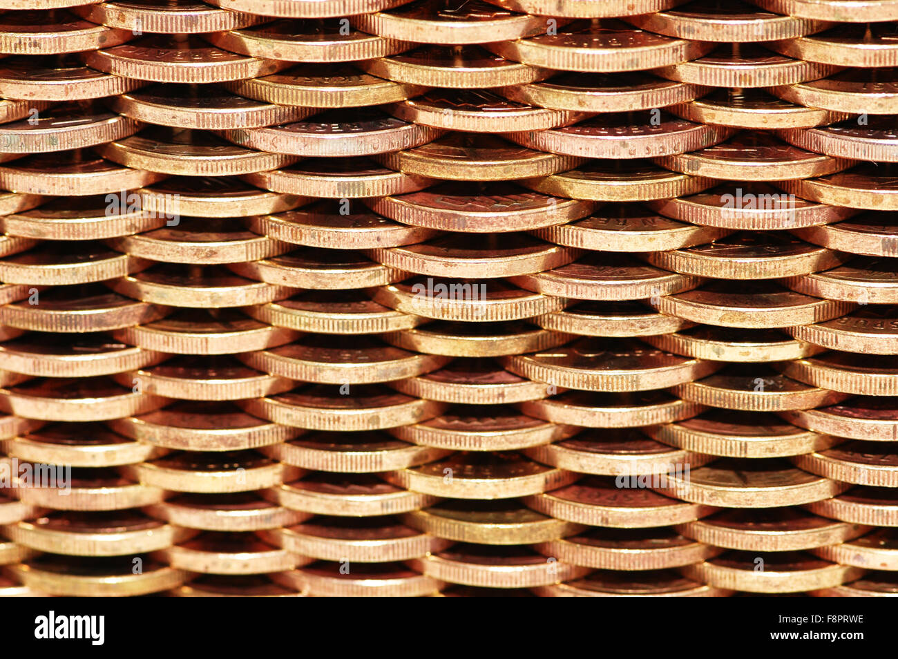 Pattern of wall made from golden coins Stock Photo - Alamy