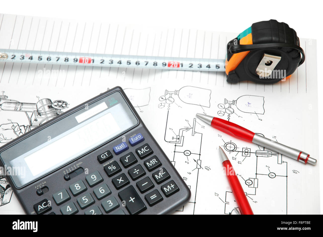Calculator and pencils over the engineering drawings Stock Photo - Alamy