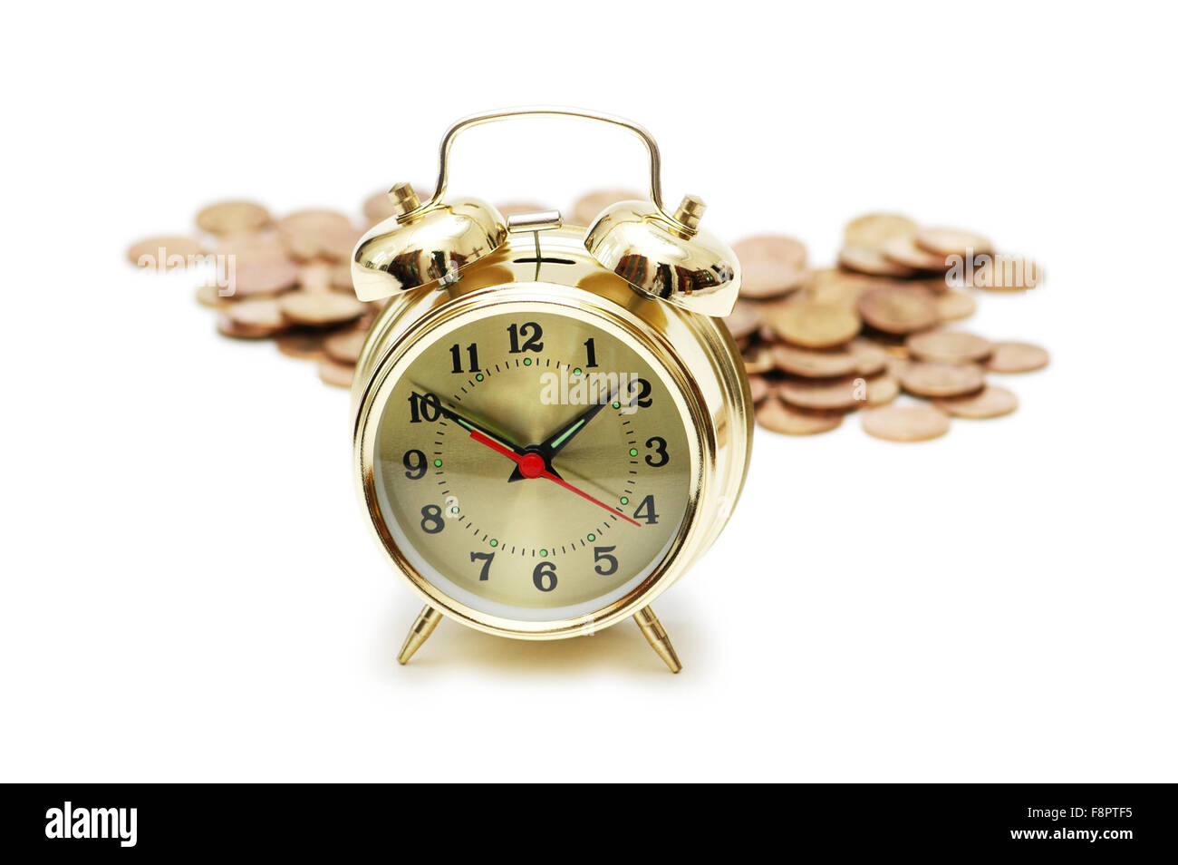 Time is money concept with clock and coins Stock Photo - Alamy