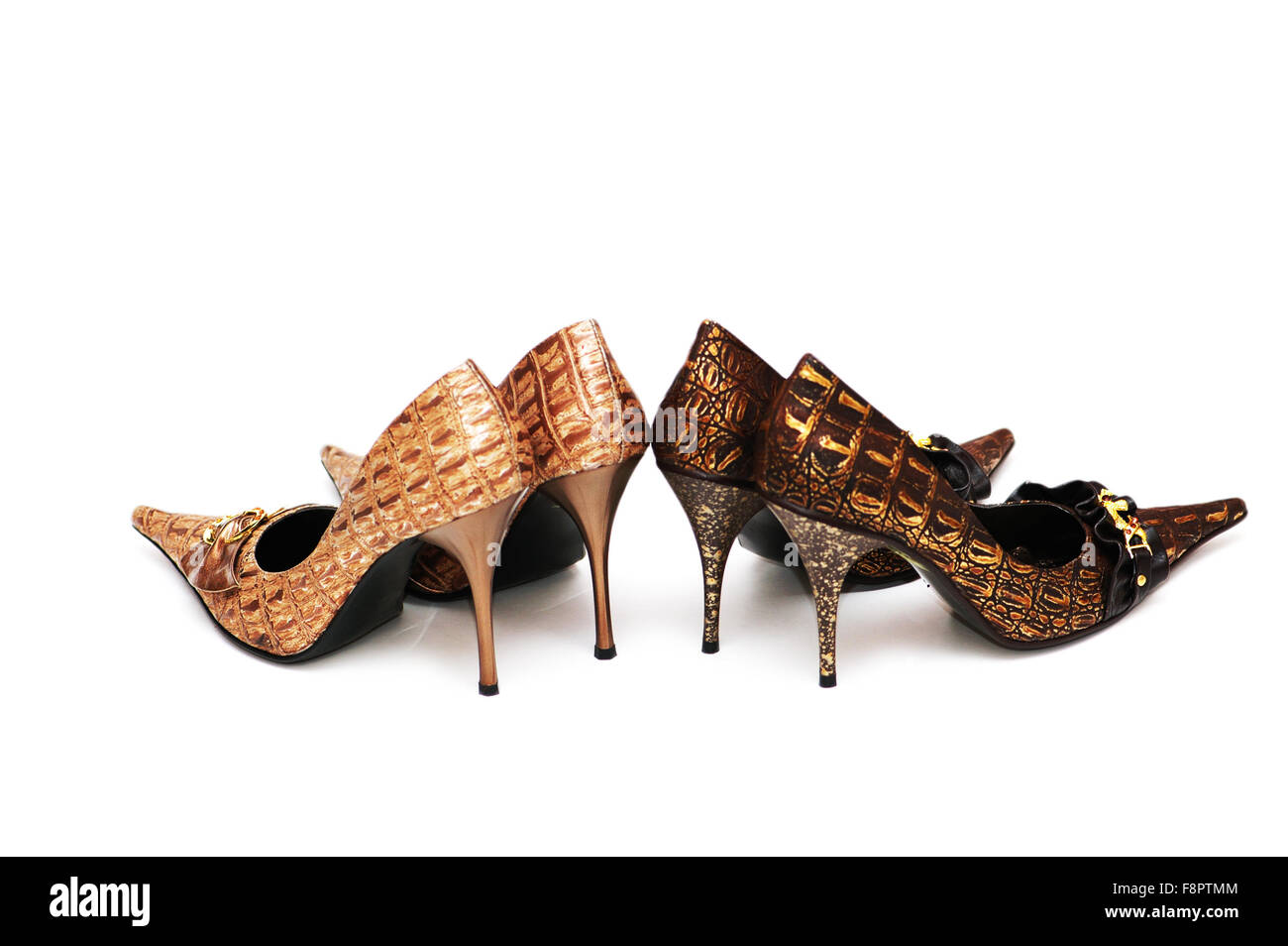 Two pairs of woman of shoes isolated Stock Photo - Alamy