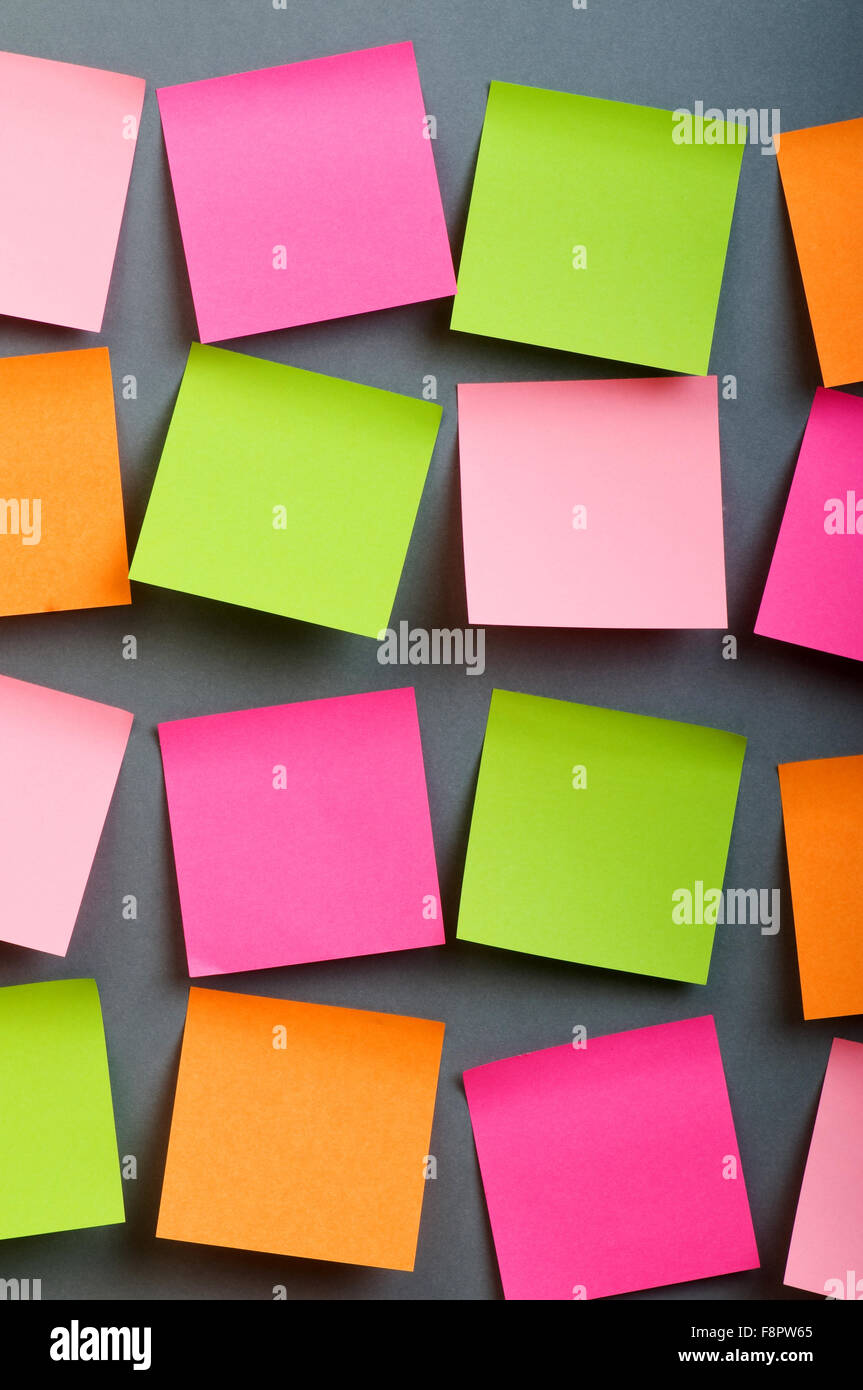 Reminder notes on the bright colorful paper Stock Photo - Alamy
