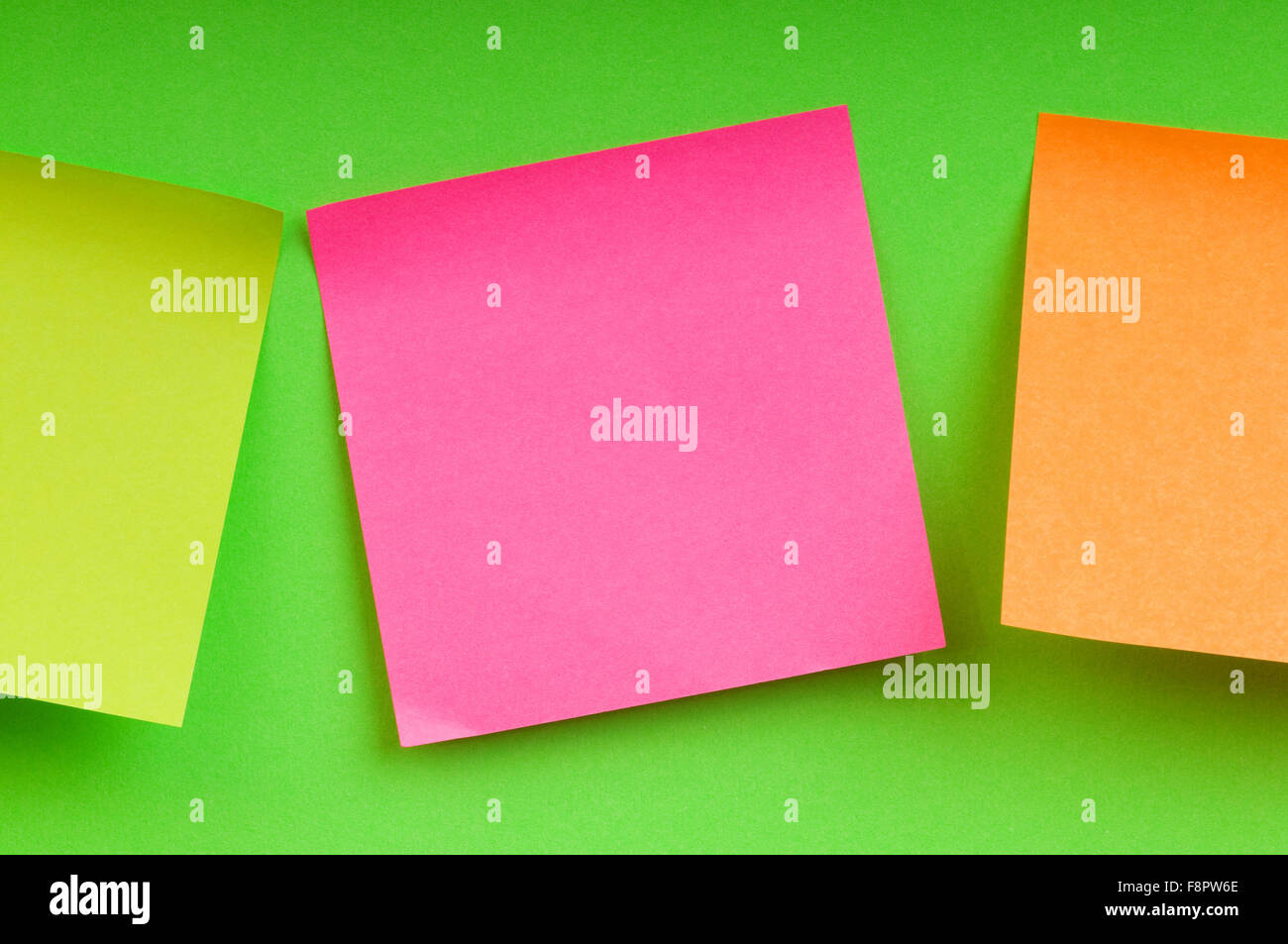 Reminder notes on the bright colorful paper Stock Photo - Alamy