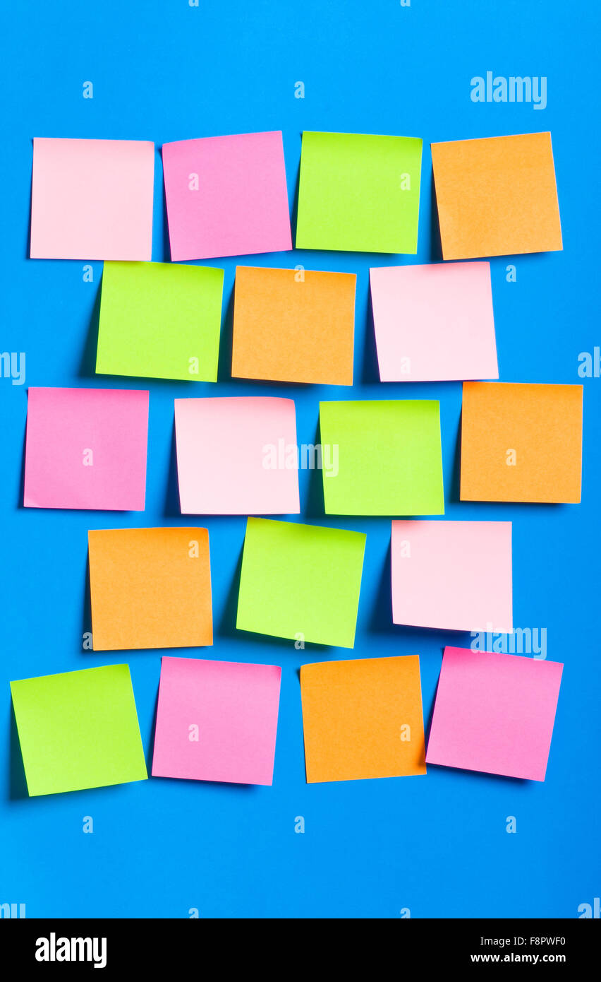Reminder notes on the bright colorful paper Stock Photo - Alamy