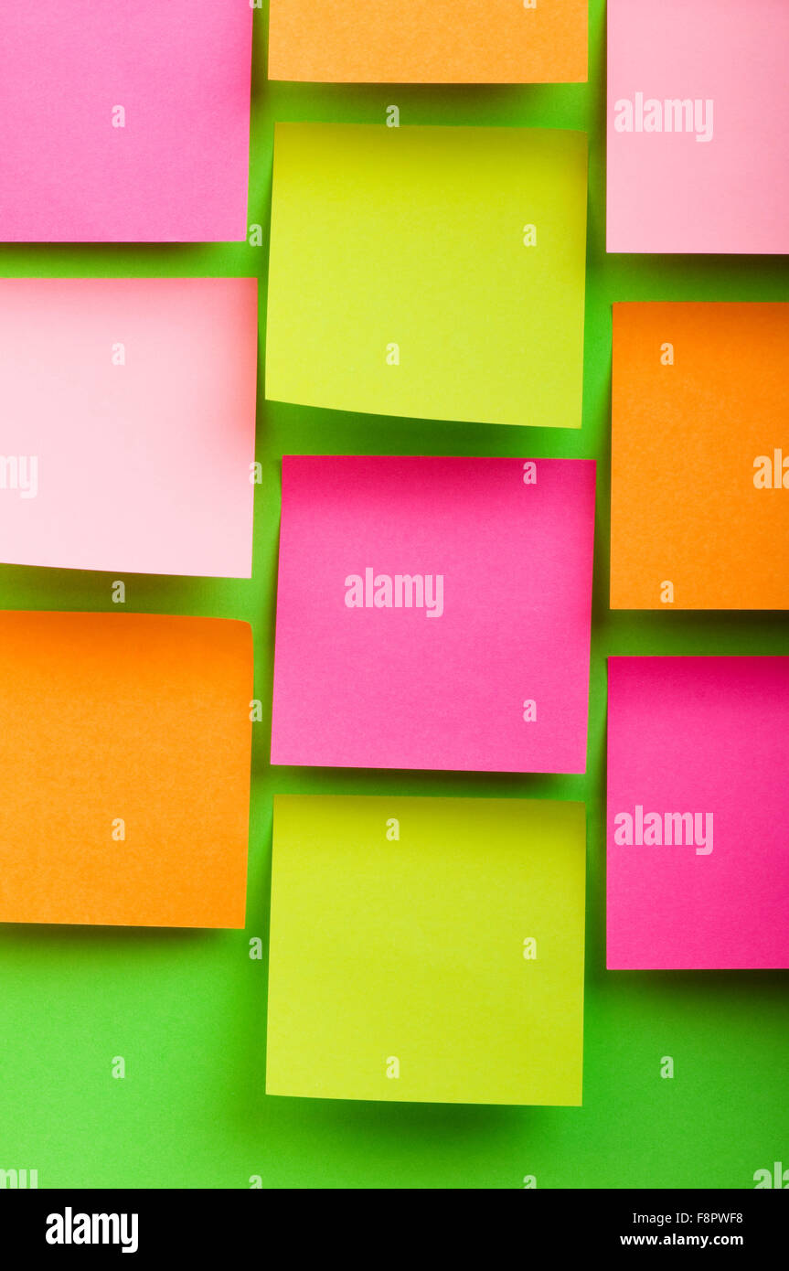 Reminder notes on the bright colorful paper Stock Photo - Alamy