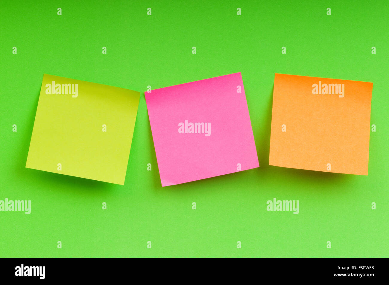 Reminder notes on the bright colorful paper Stock Photo - Alamy