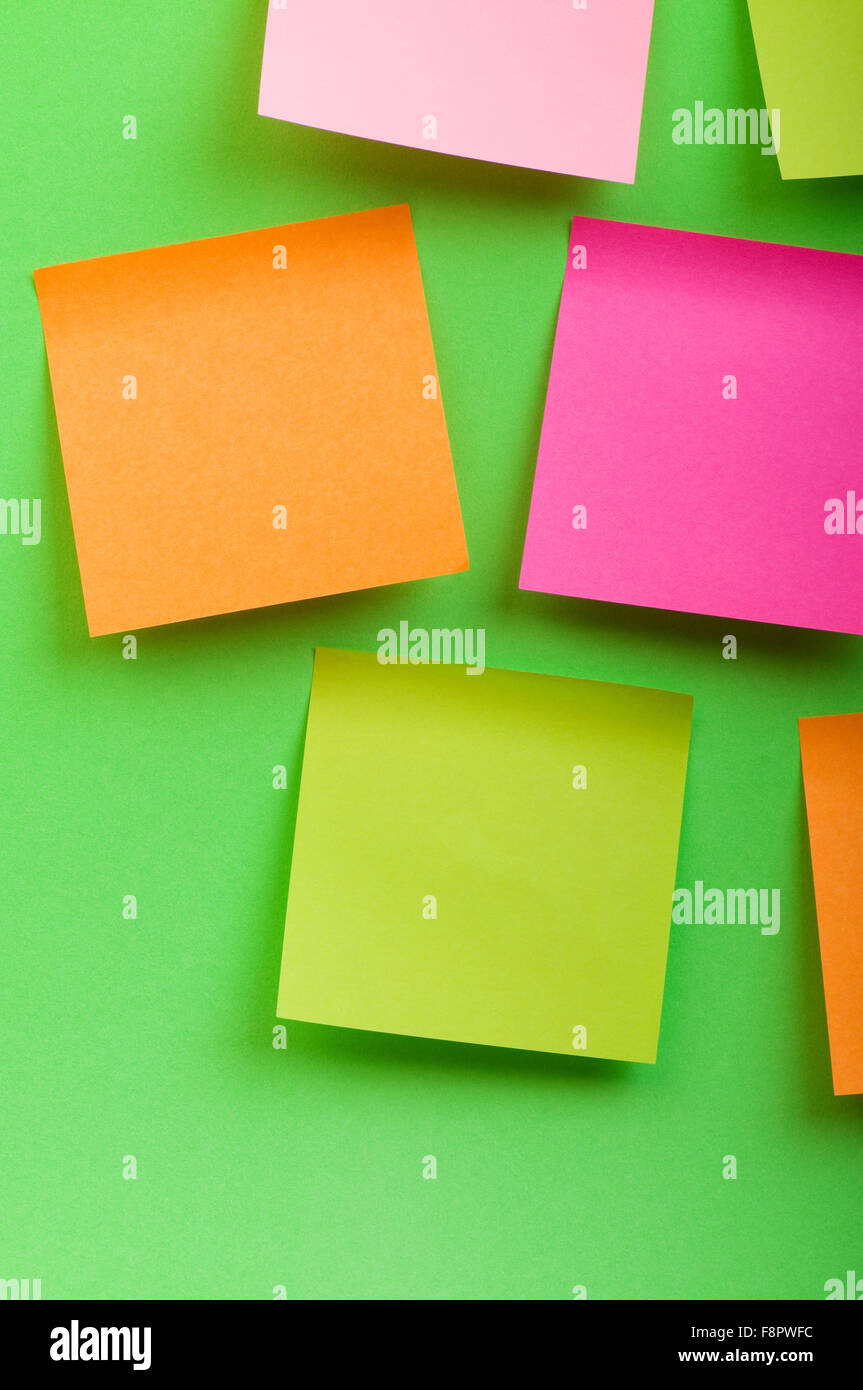 Reminder notes on the bright colorful paper Stock Photo - Alamy