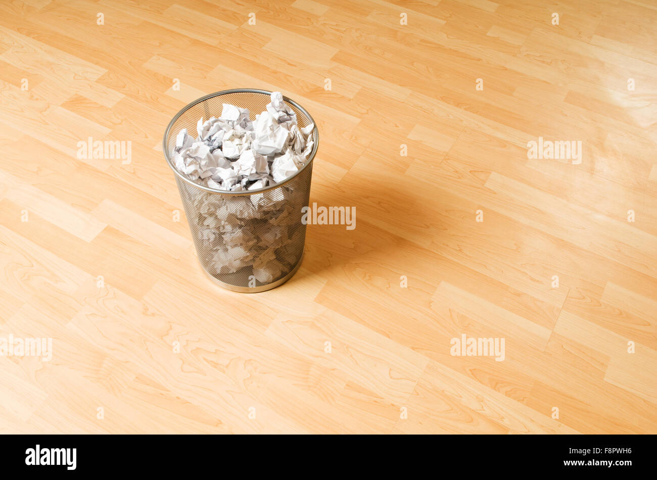 Garbage bin with paper waste isolated on white Stock Photo - Alamy