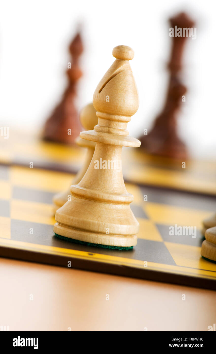 Set of chess figures on the playing board Stock Photo - Alamy