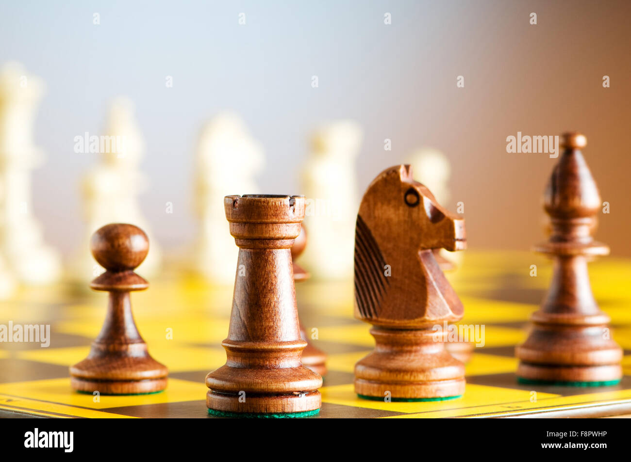 Set of chess figures on the playing board Stock Photo - Alamy