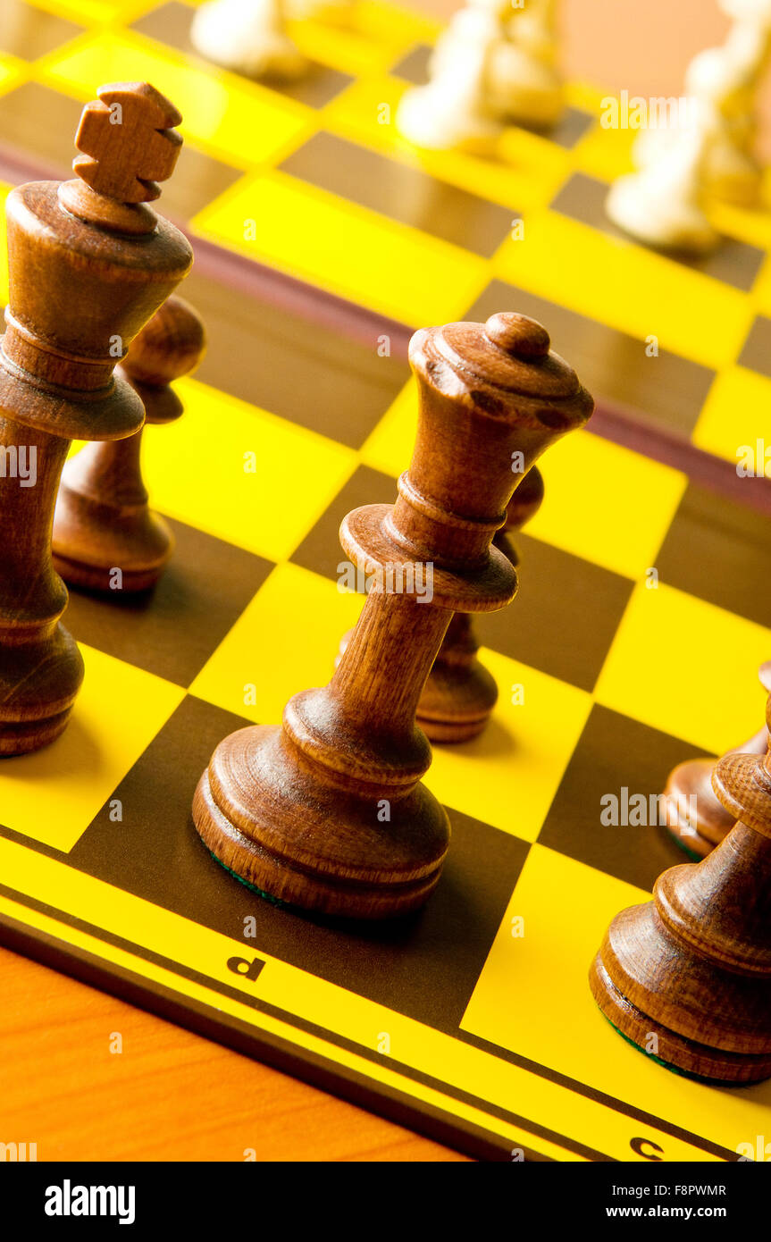Set of chess figures on the playing board Stock Photo - Alamy