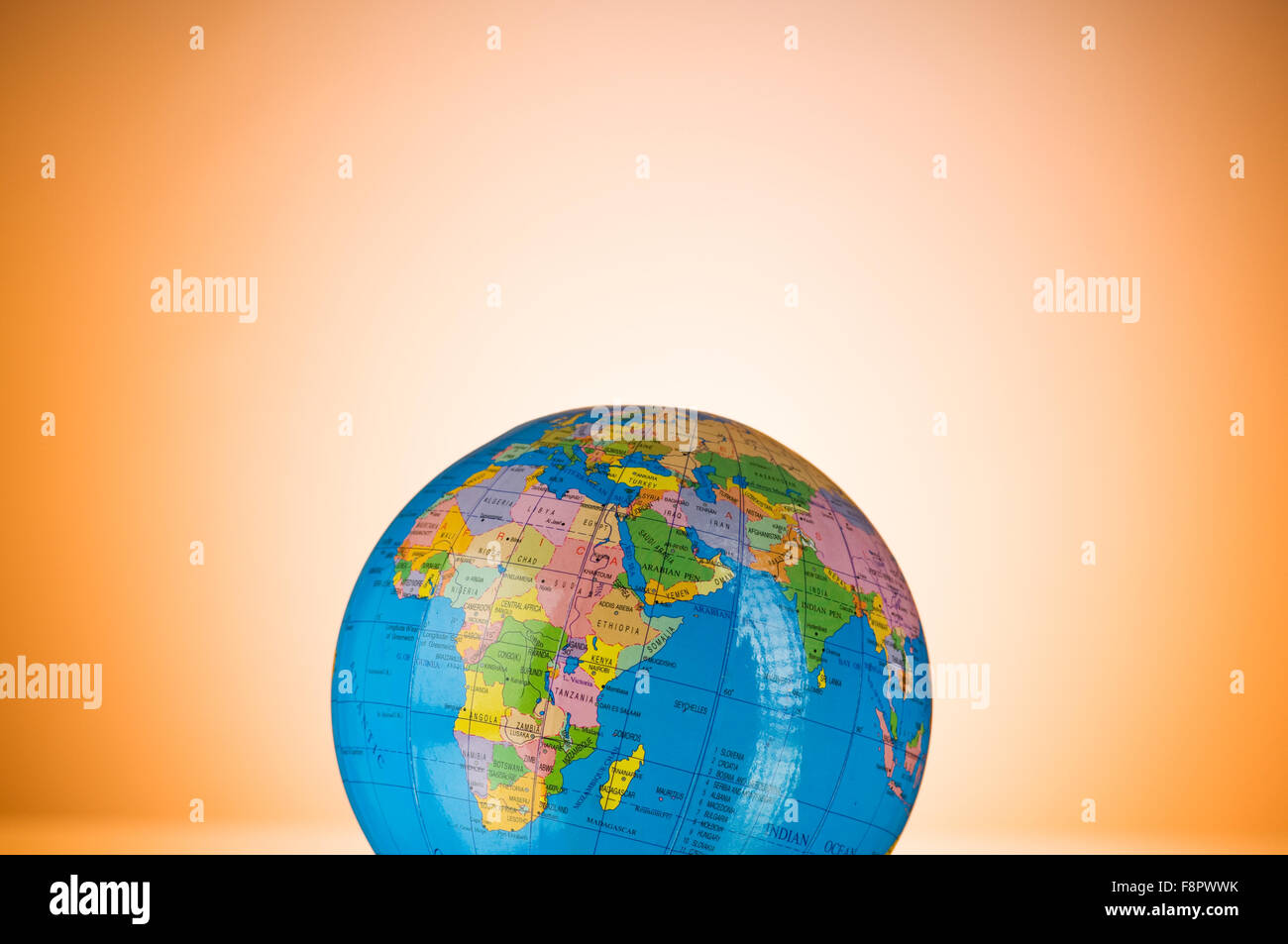 Globalisation concept - globe against gradient colorful background ...