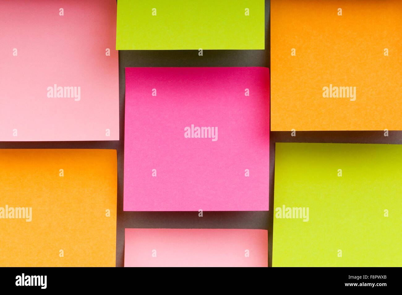Reminder notes on the bright colorful paper Stock Photo - Alamy