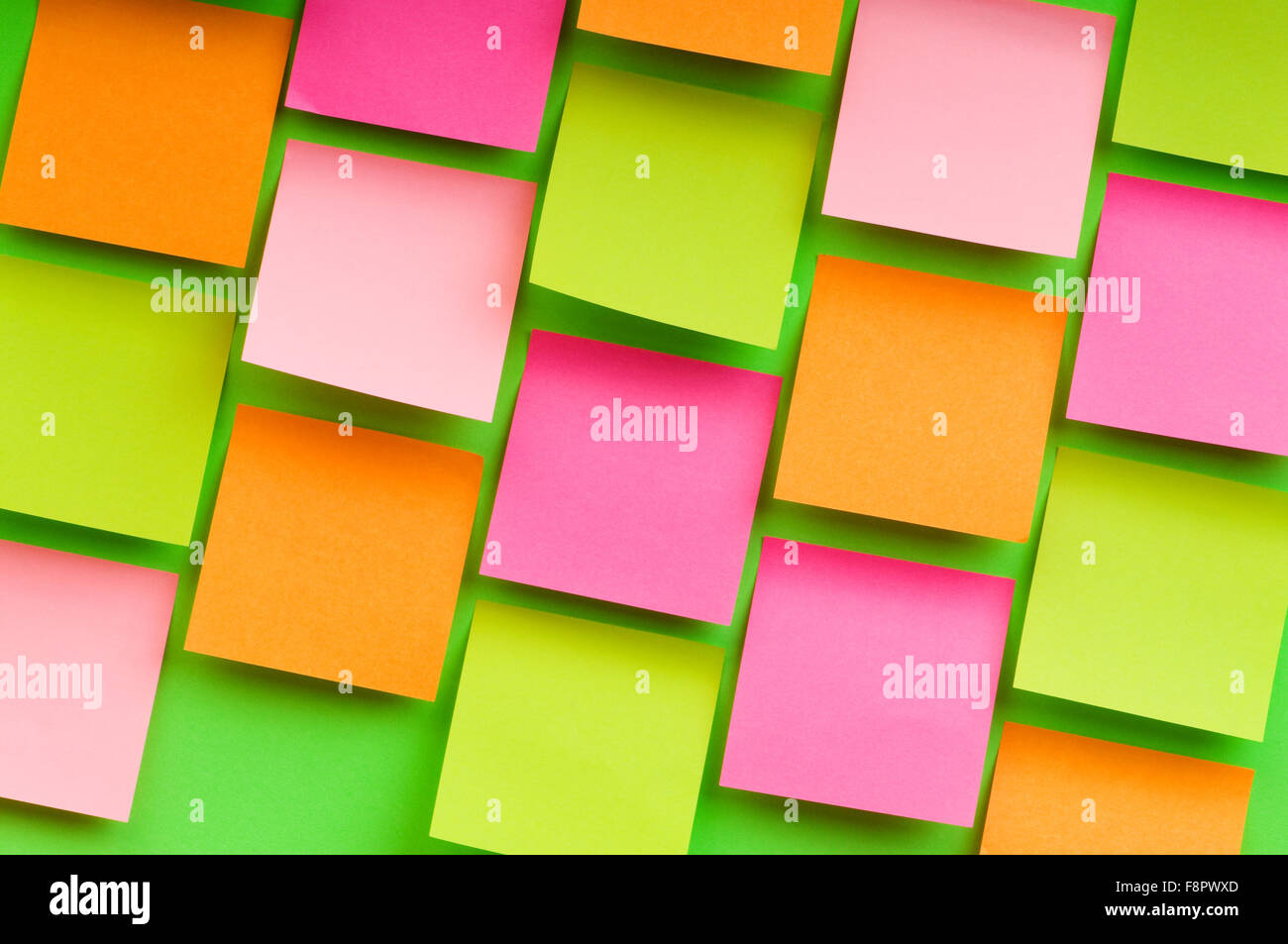 Reminder notes on the bright colorful paper Stock Photo - Alamy
