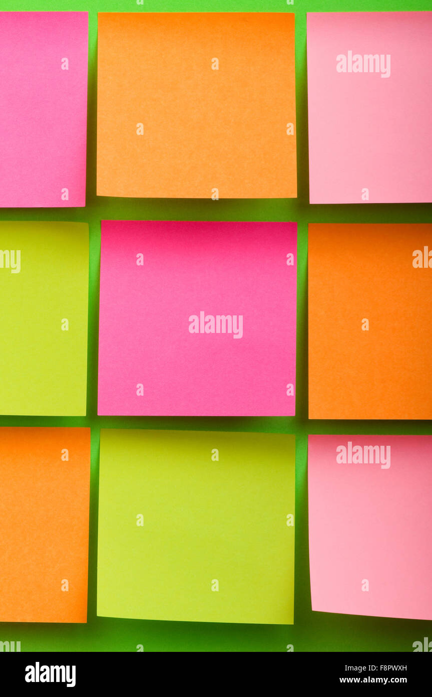 Reminder notes on the bright colorful paper Stock Photo - Alamy