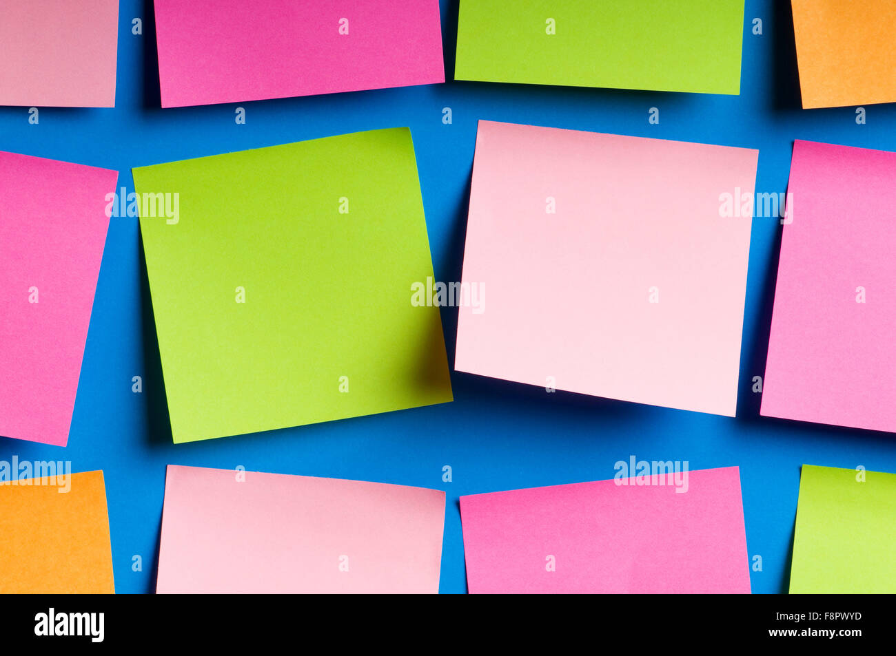 Reminder notes on the bright colorful paper Stock Photo - Alamy