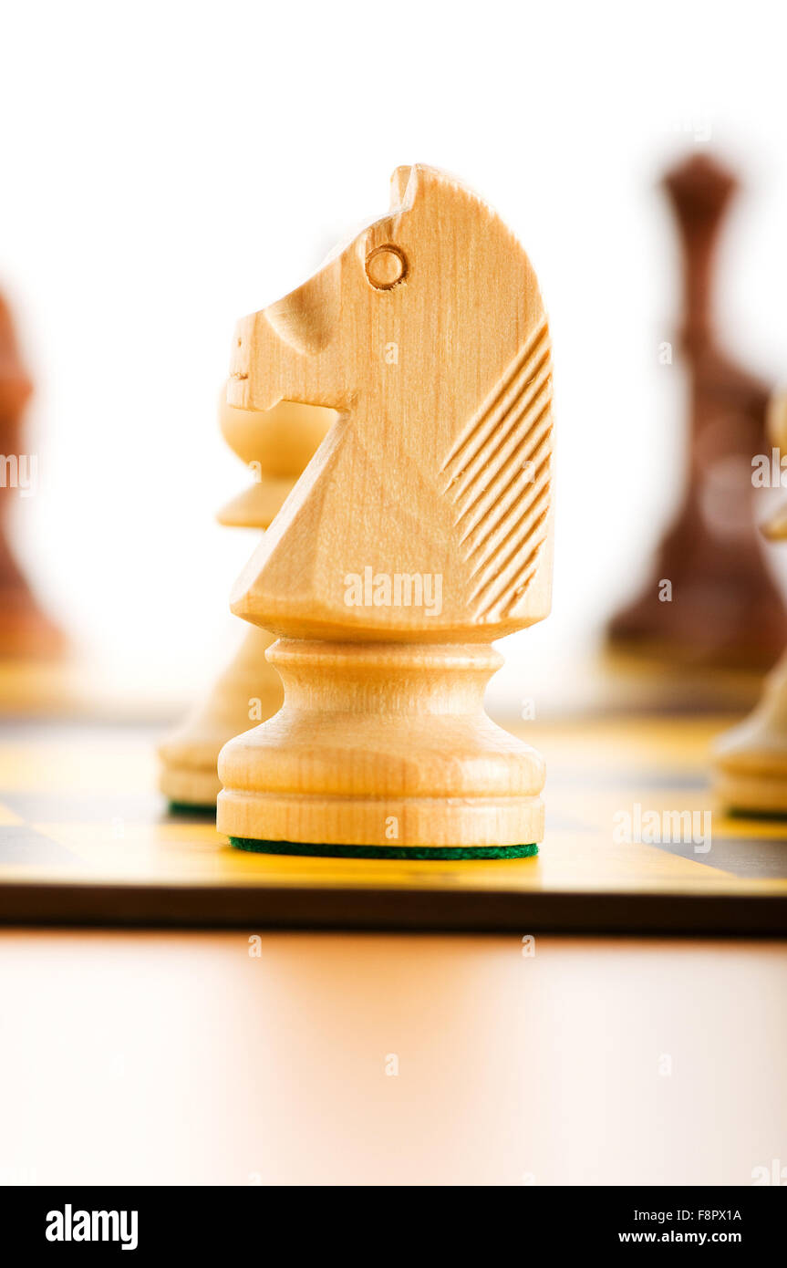 Set of chess figures on the playing board Stock Photo - Alamy