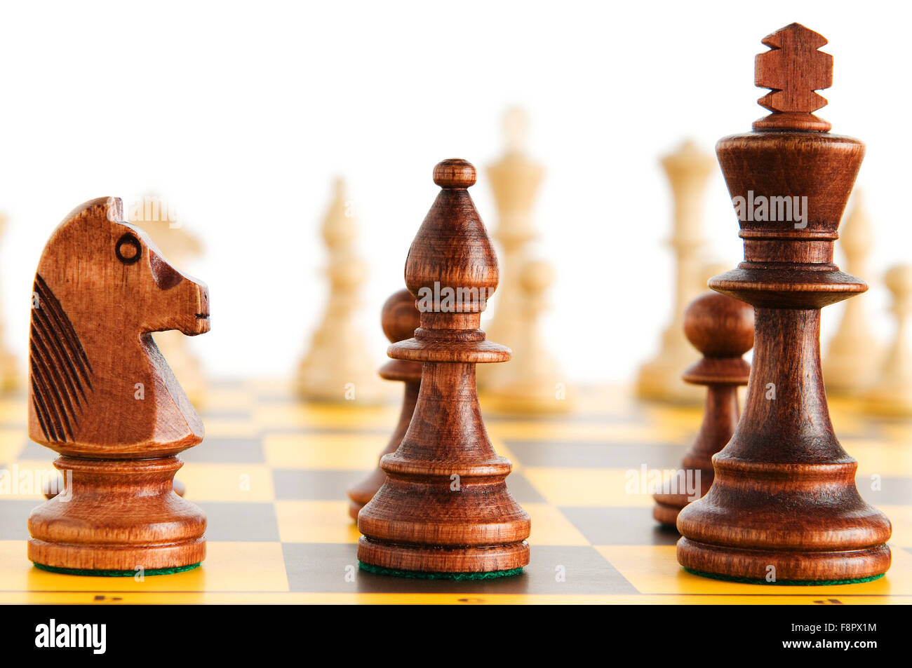 Set of chess figures on the playing board Stock Photo - Alamy