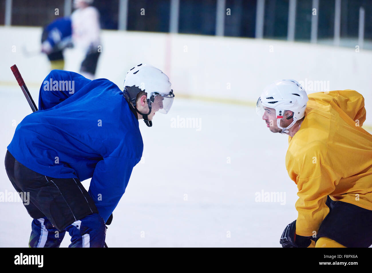 ice hockey player in action kicking with stick Stock Photo - Alamy