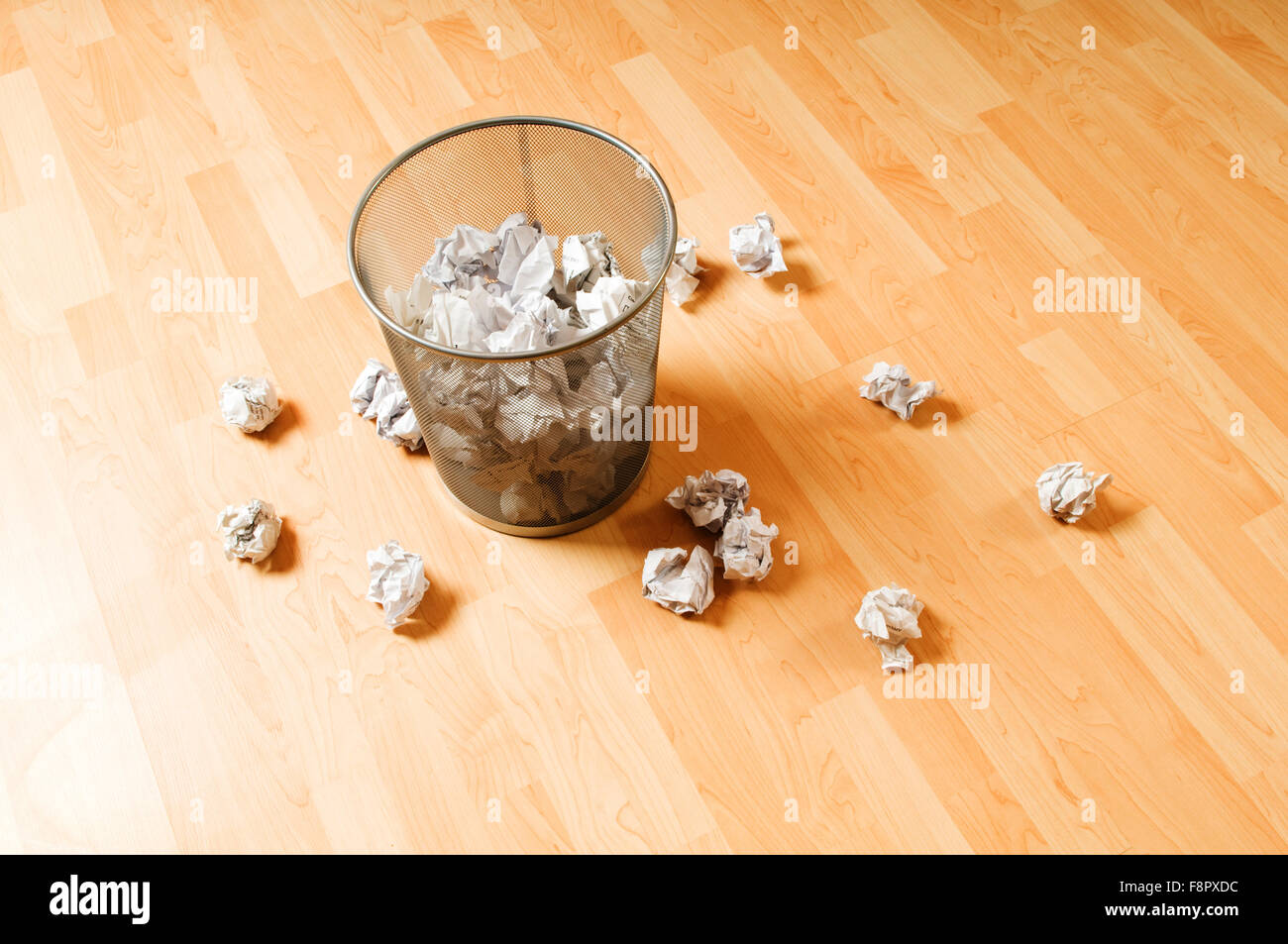 Garbage bin with paper waste isolated on white Stock Photo - Alamy
