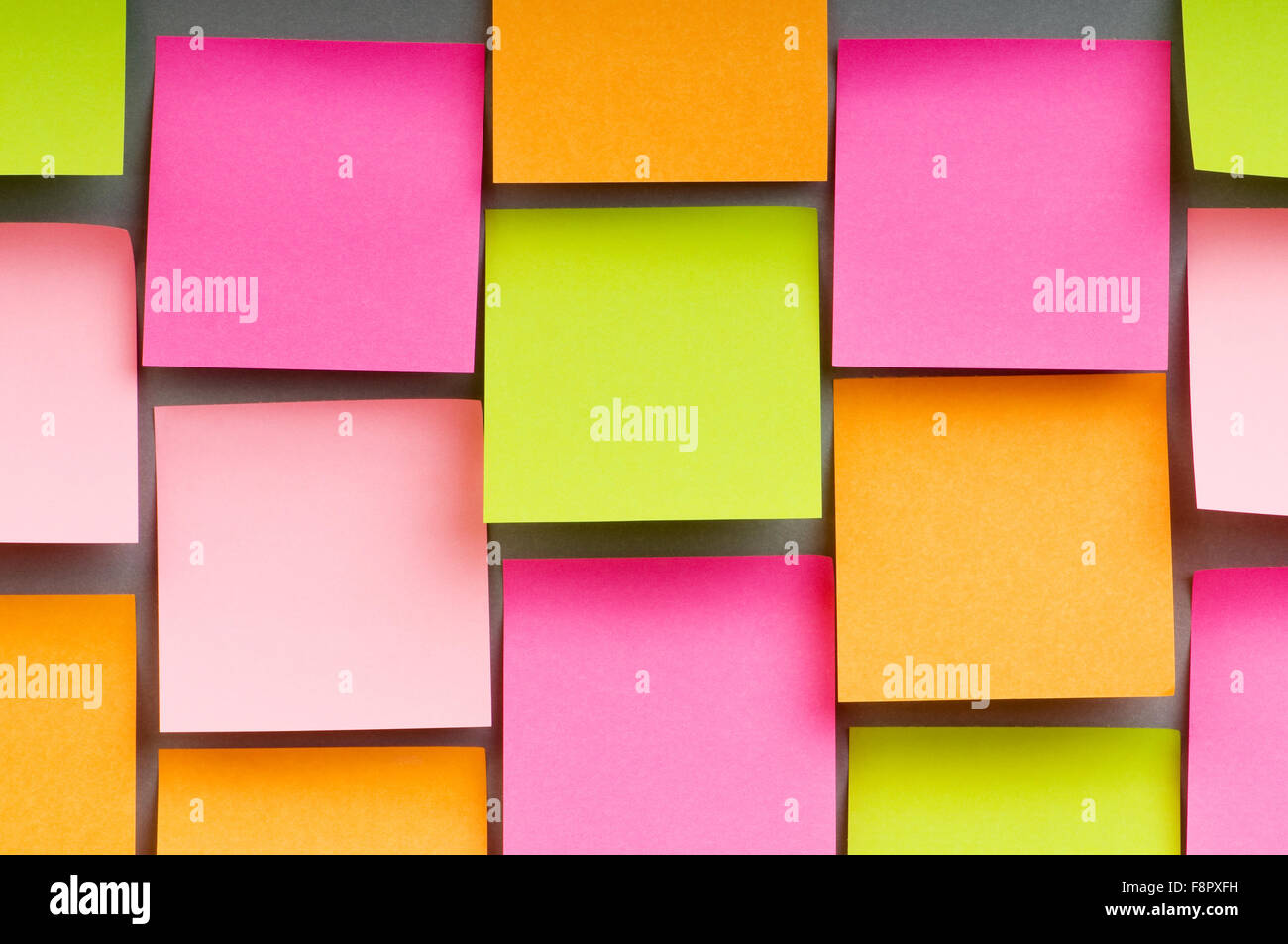 Reminder notes on the bright colorful paper Stock Photo - Alamy