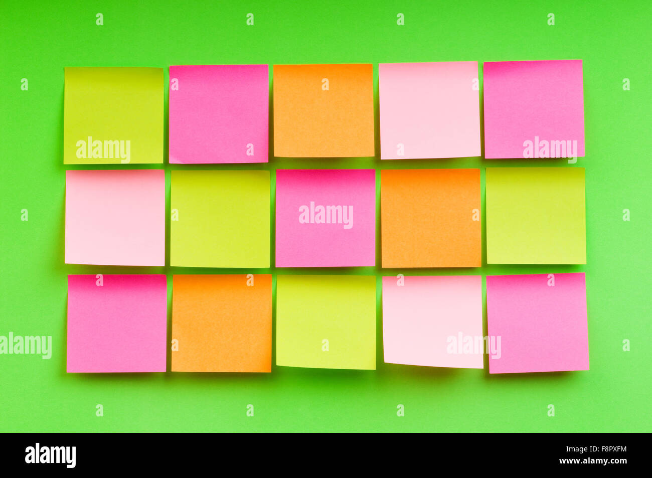 Reminder notes on the bright colorful paper Stock Photo - Alamy