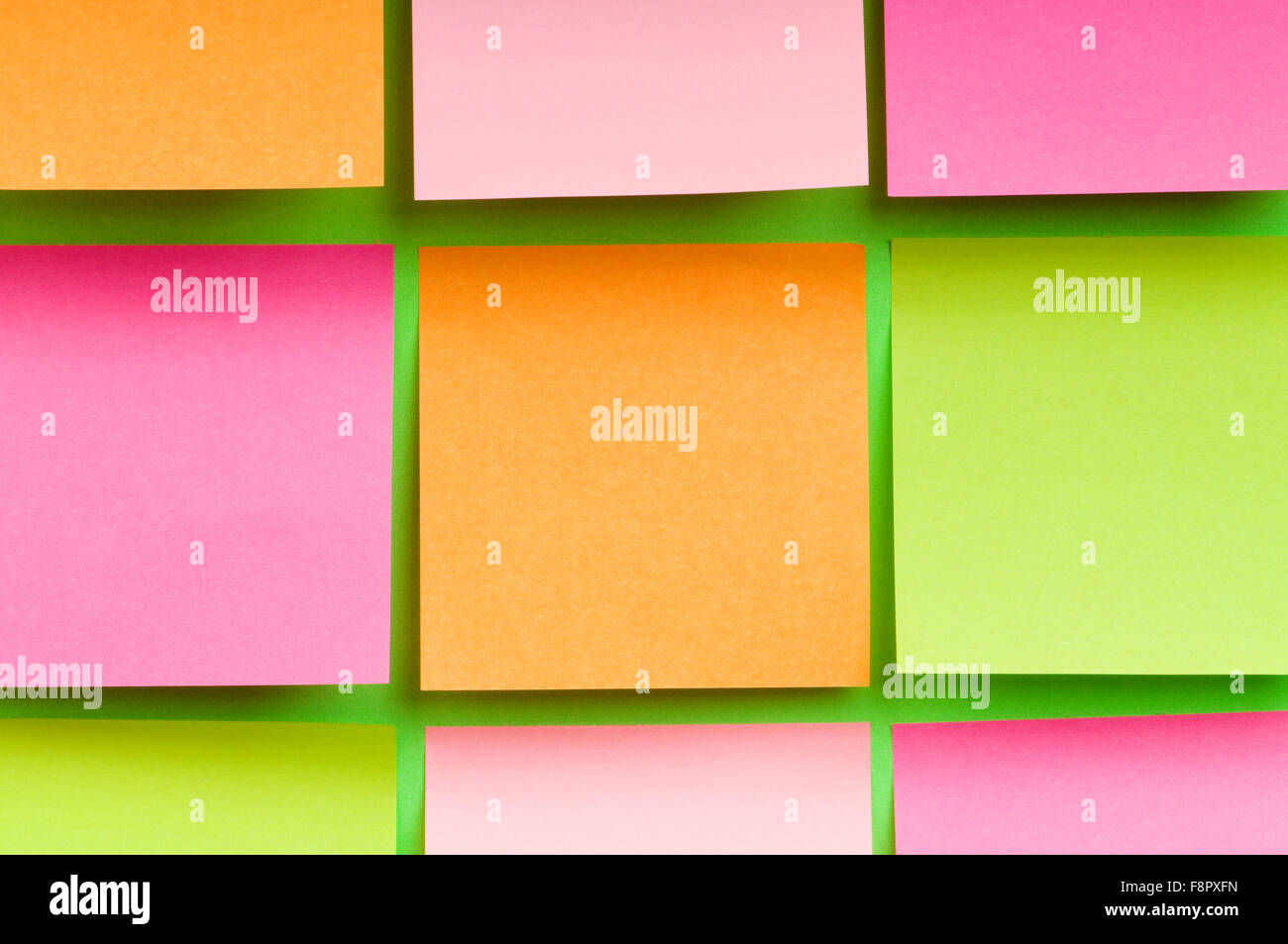 Reminder notes on the bright colorful paper Stock Photo - Alamy