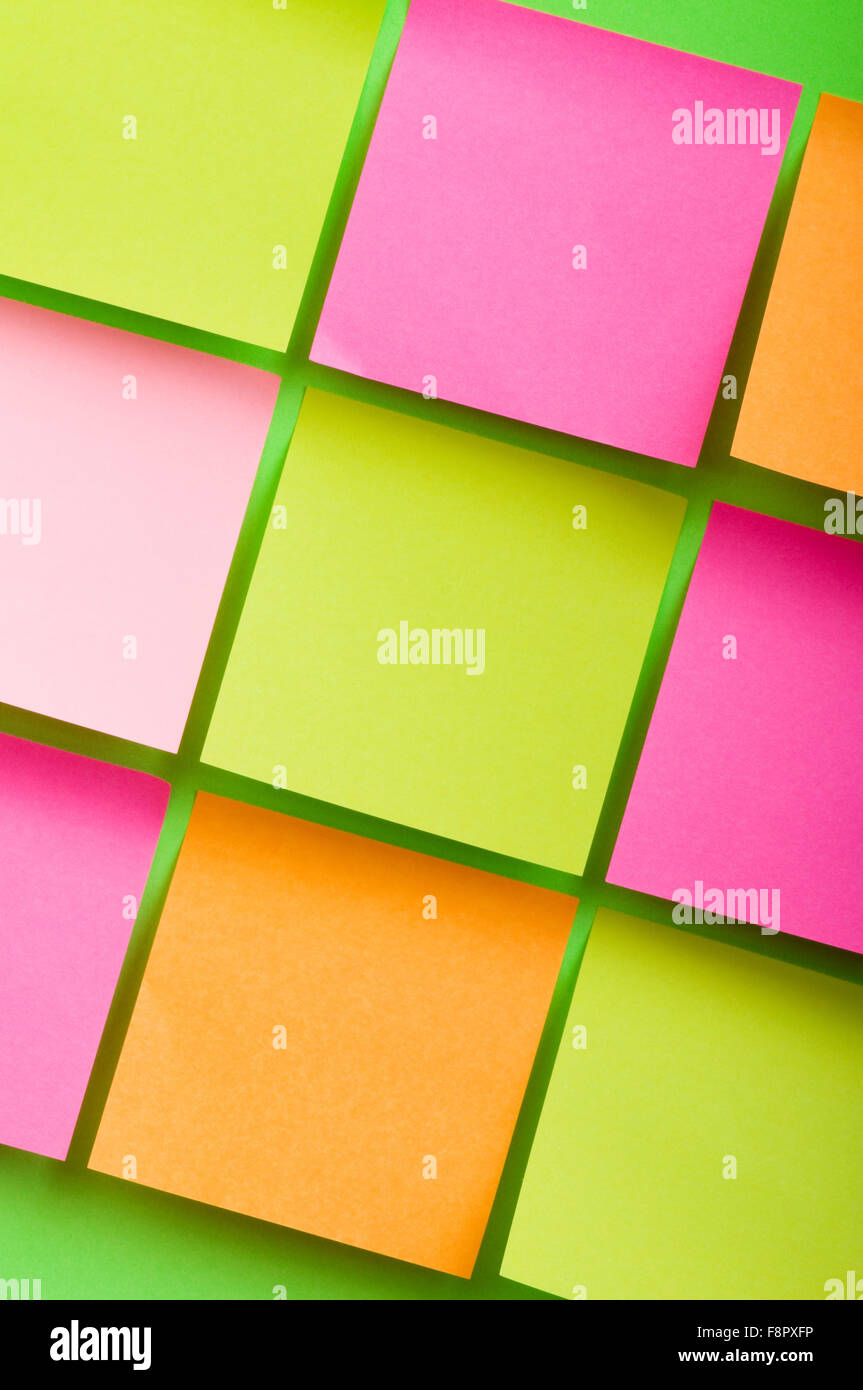Reminder notes on the bright colorful paper Stock Photo - Alamy