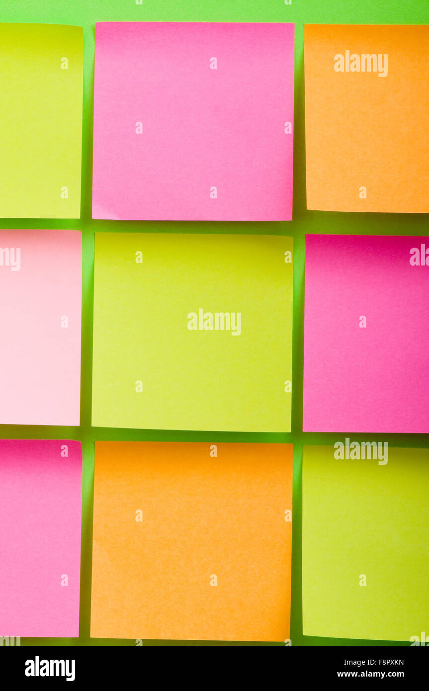 Reminder notes on the bright colorful paper Stock Photo - Alamy