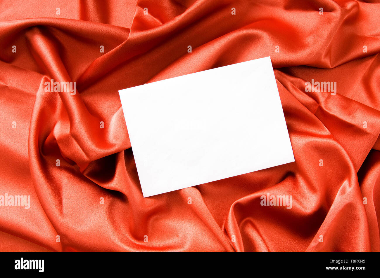 Blank message on the red satin background Stock Photo - Alamy