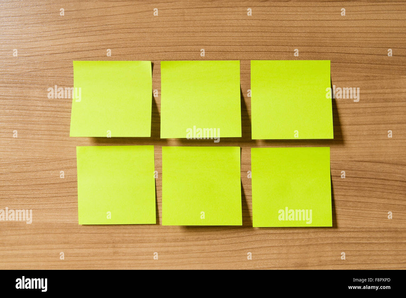 Many reminder notes on the wooden background Stock Photo - Alamy