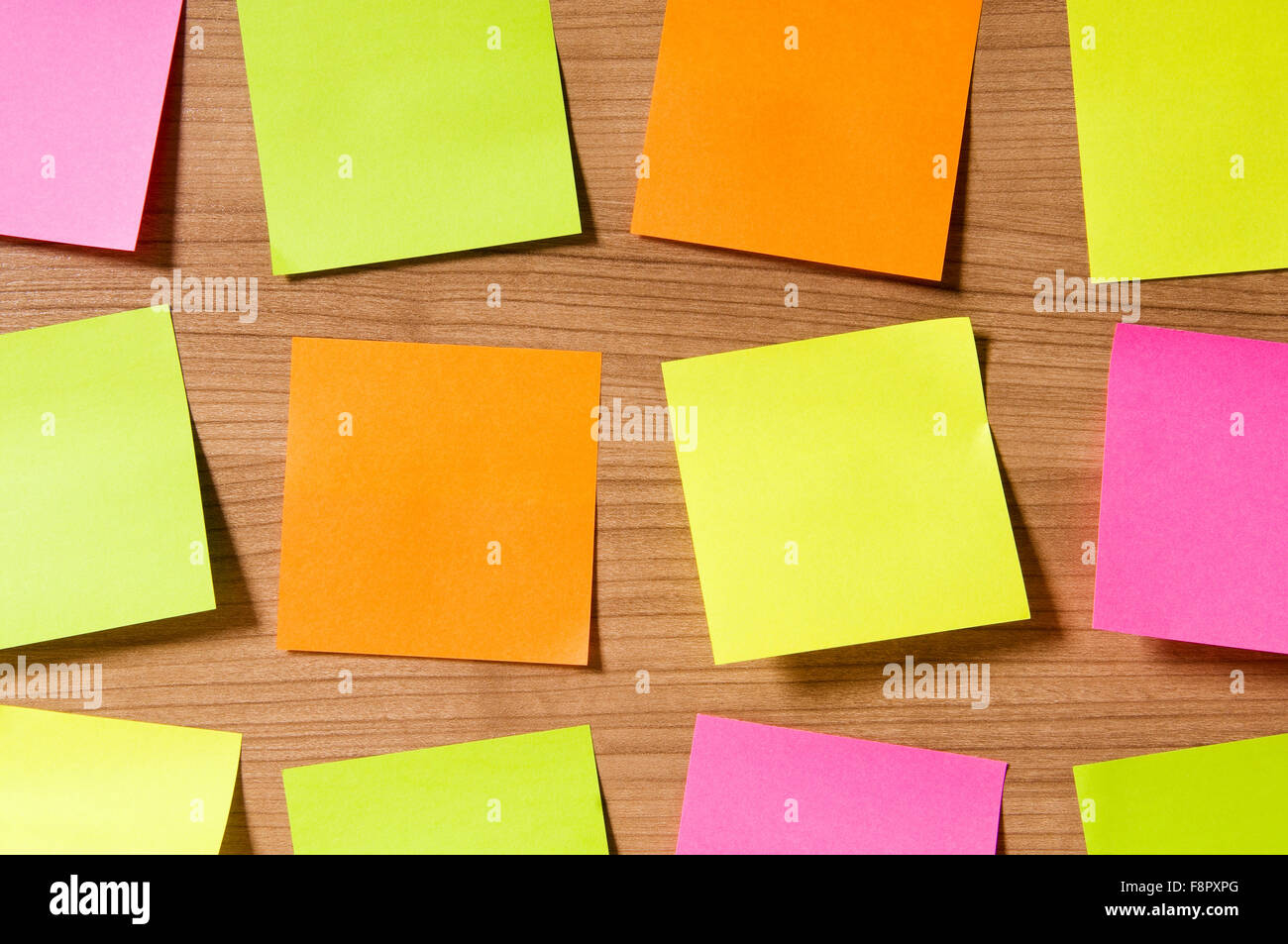 Many reminder notes on the wooden background Stock Photo - Alamy