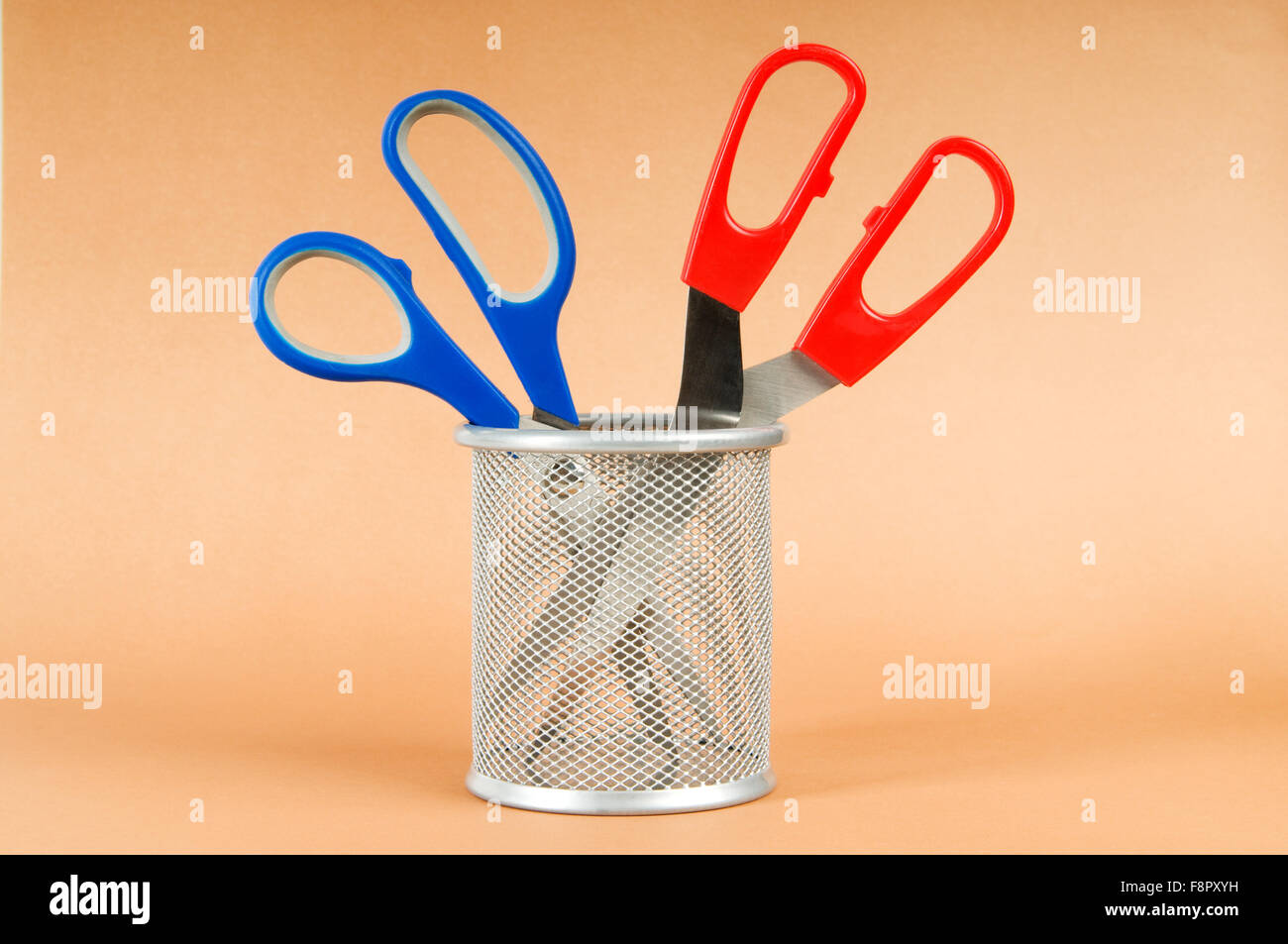 Colorful scissors on the color paper background Stock Photo - Alamy