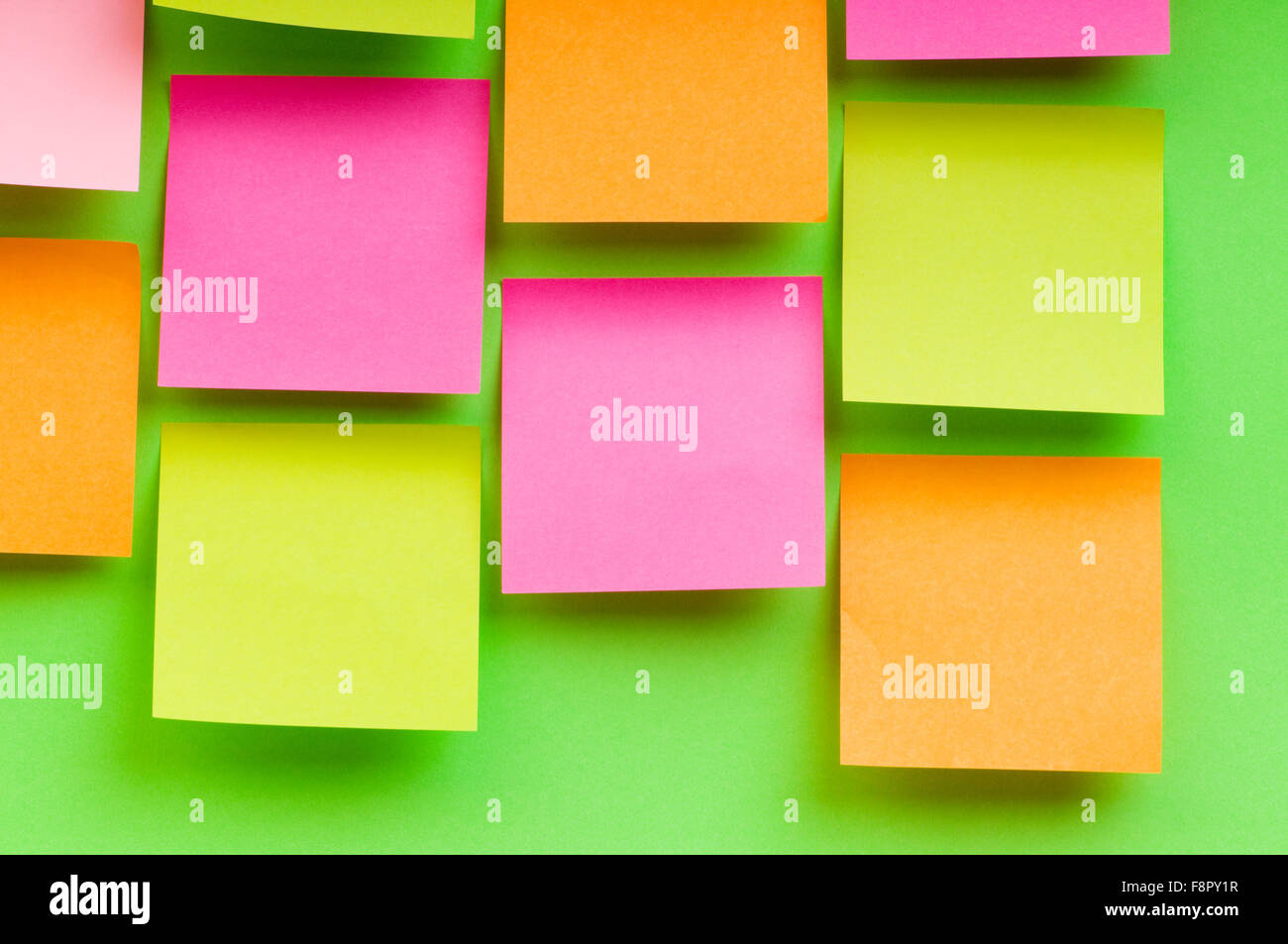 Reminder notes on the bright colorful paper Stock Photo - Alamy