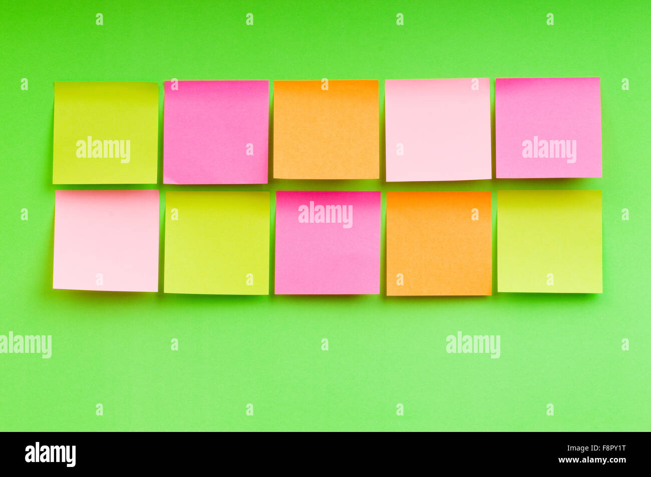 Reminder notes on the bright colorful paper Stock Photo - Alamy