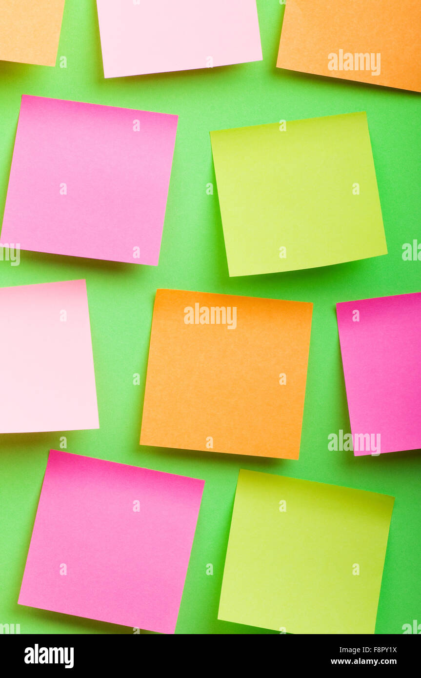Reminder notes on the bright colorful paper Stock Photo - Alamy