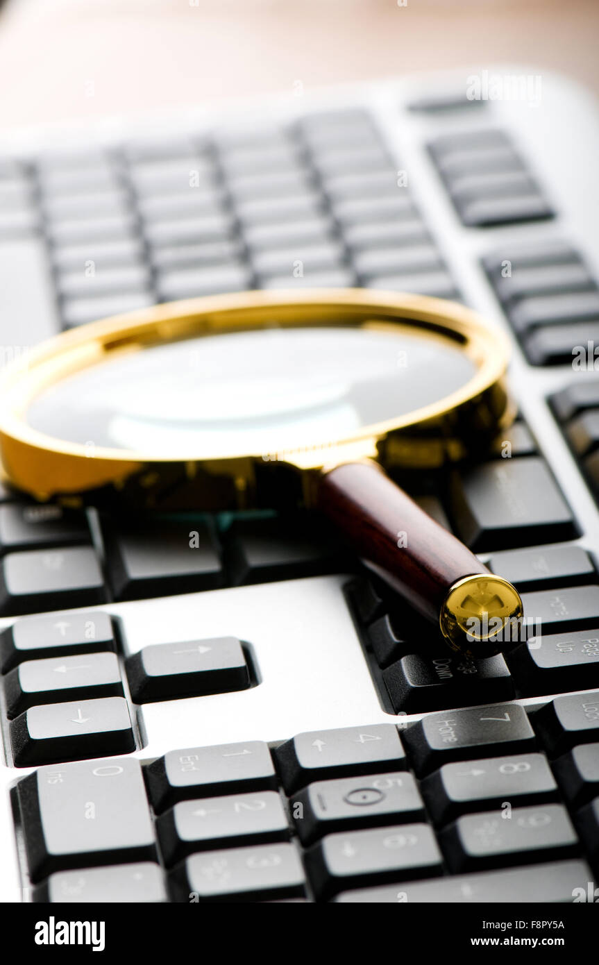 Computer security concept with keyboard and magnifying glass Stock ...
