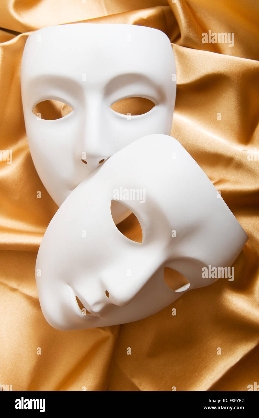 Theatre concept with the white plastic masks Stock Photo - Alamy