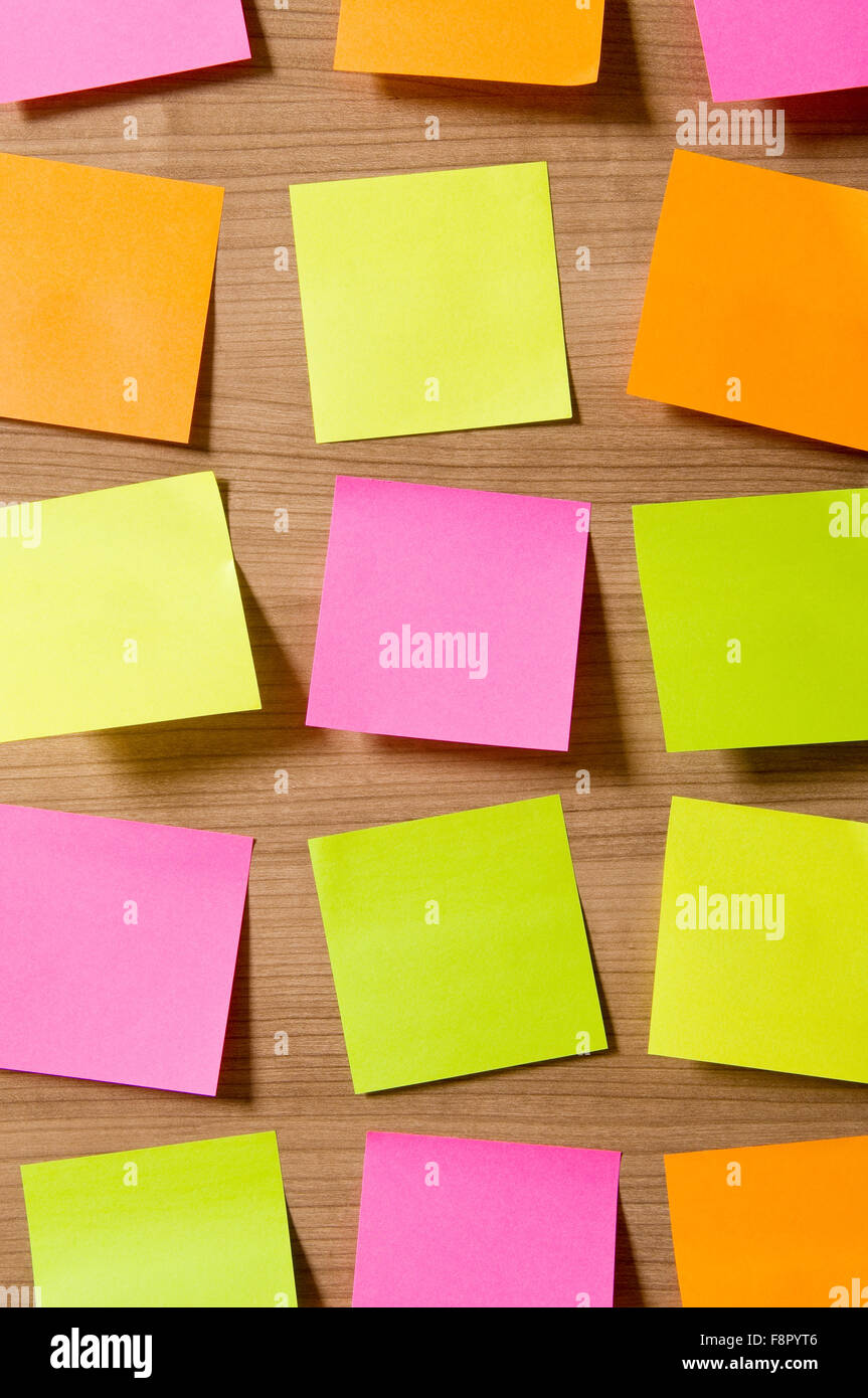 Many reminder notes on the wooden background Stock Photo - Alamy
