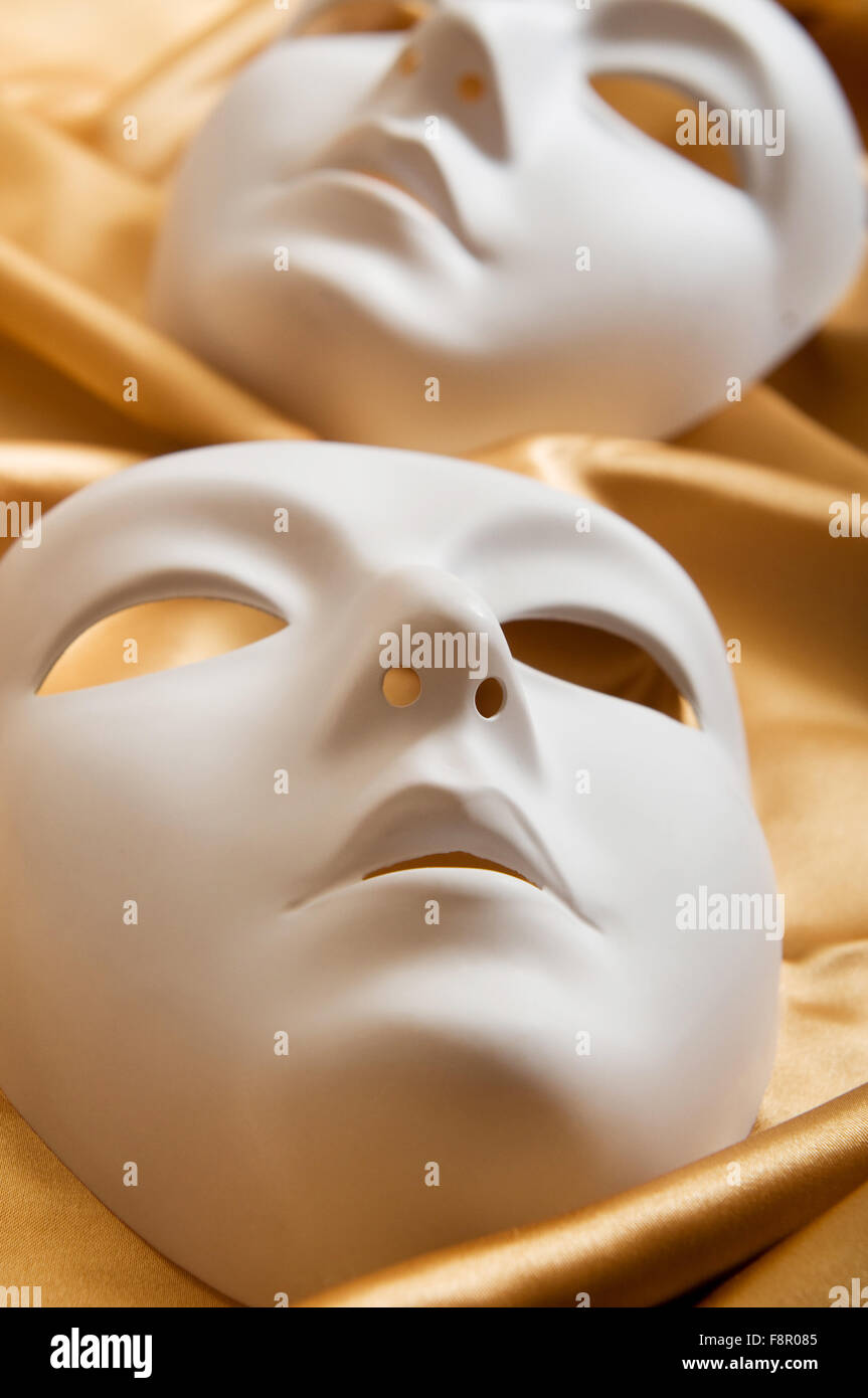 Theatre concept with the white plastic masks Stock Photo - Alamy