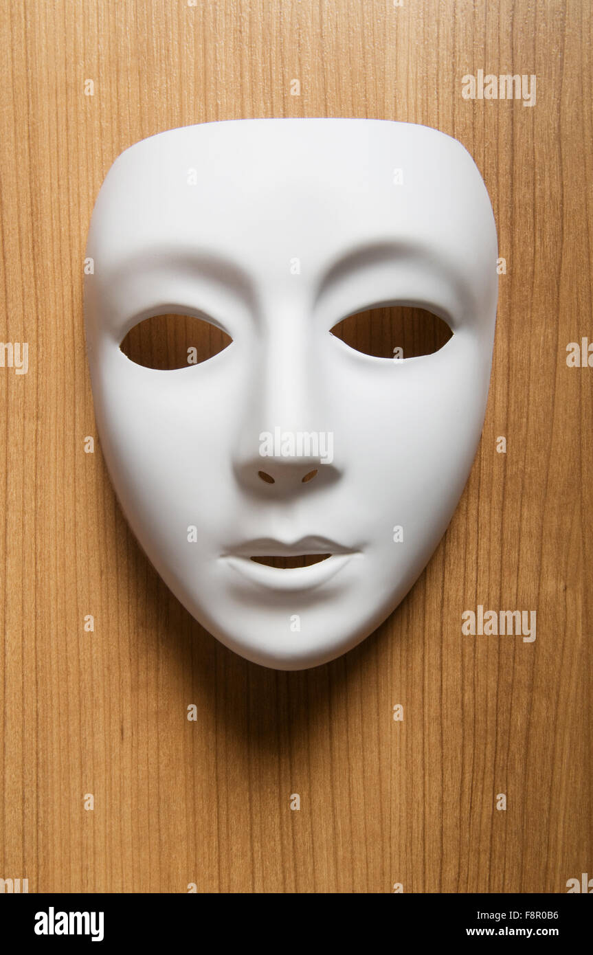 Theatre concept with the white plastic masks Stock Photo - Alamy