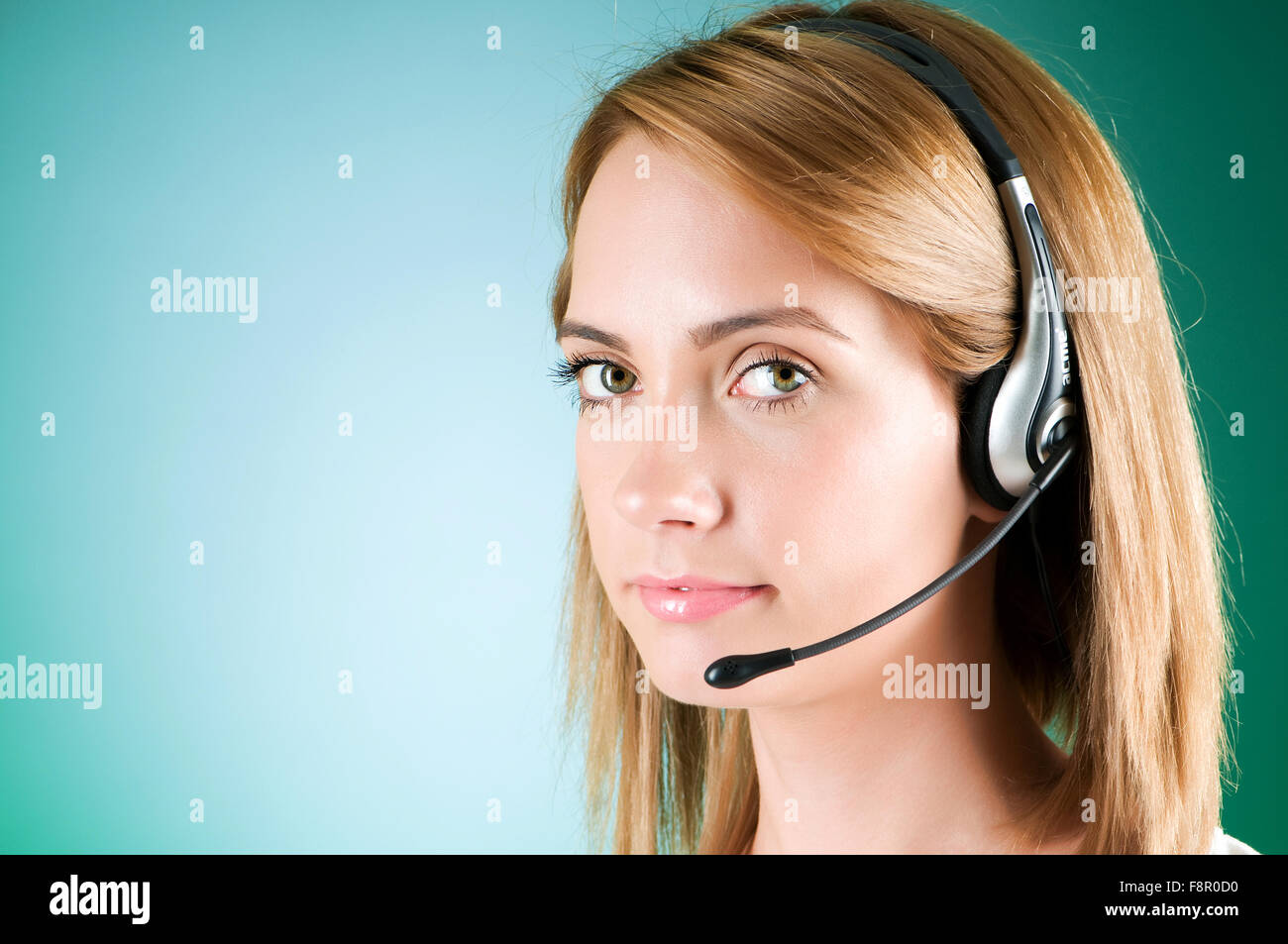 Young call center operator with the headset Stock Photo - Alamy