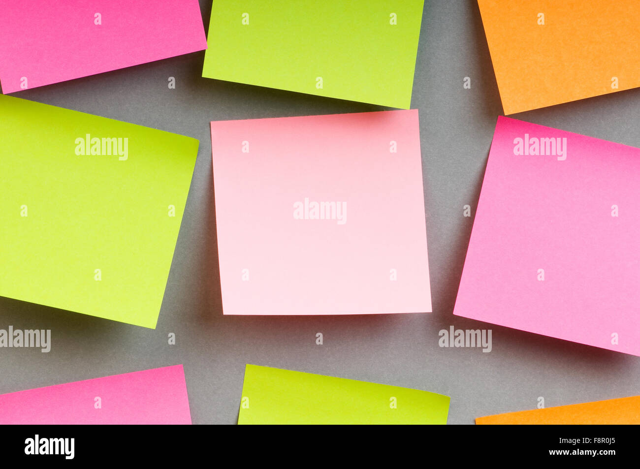 Reminder notes on the bright colorful paper Stock Photo - Alamy