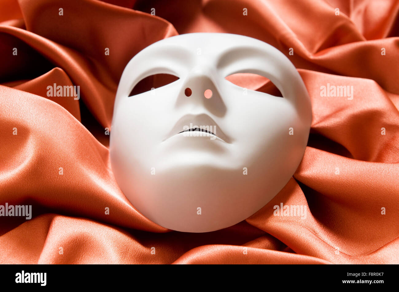 Theatre concept with the white plastic masks Stock Photo - Alamy