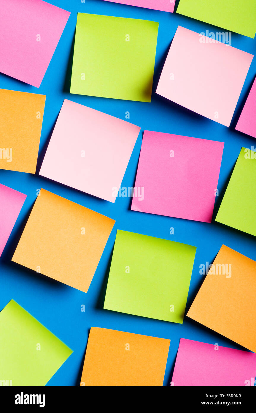 Reminder notes on the bright colorful paper Stock Photo - Alamy