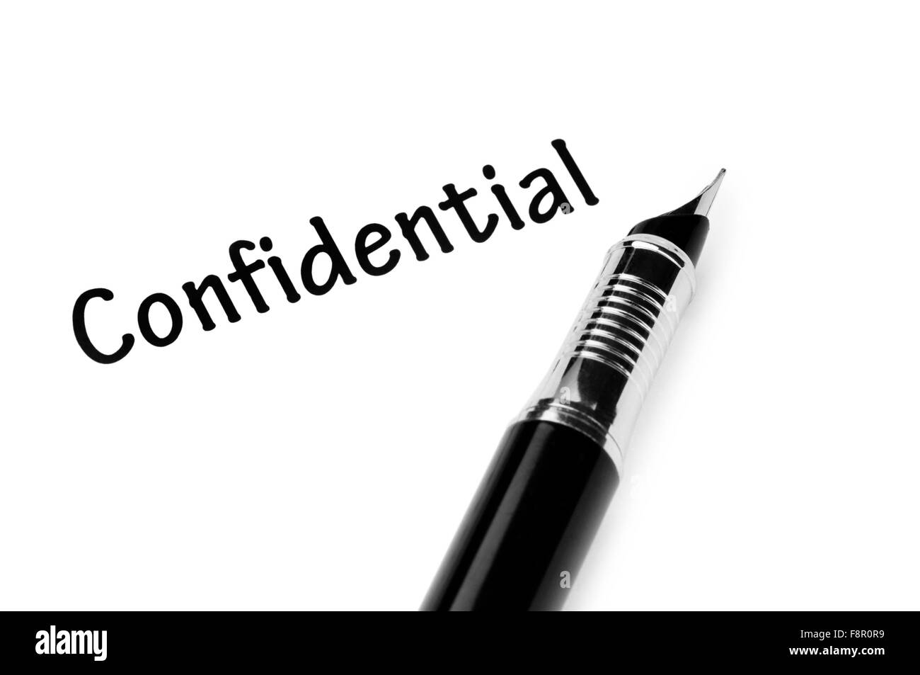 Pen and confidential message on white Stock Photo - Alamy